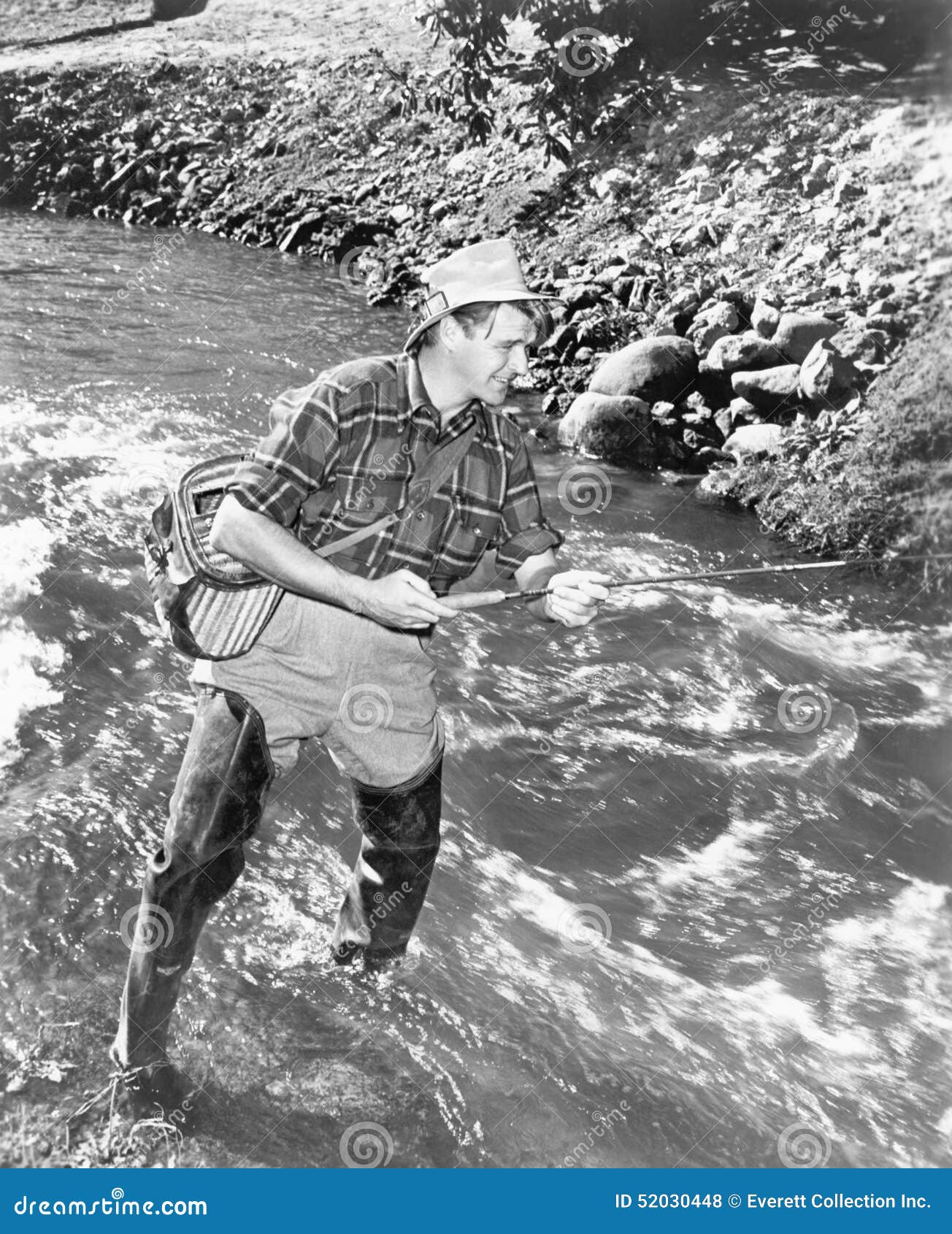 Man Standing in a Stream of Water Fishing Stock Photo - Image of ...