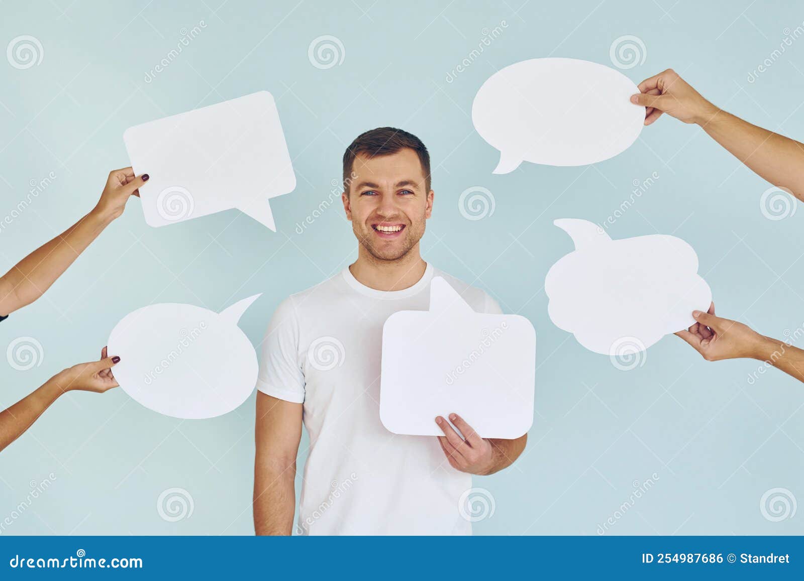 Man Standing in the Studio with Empty Signs for the Text Stock Photo ...