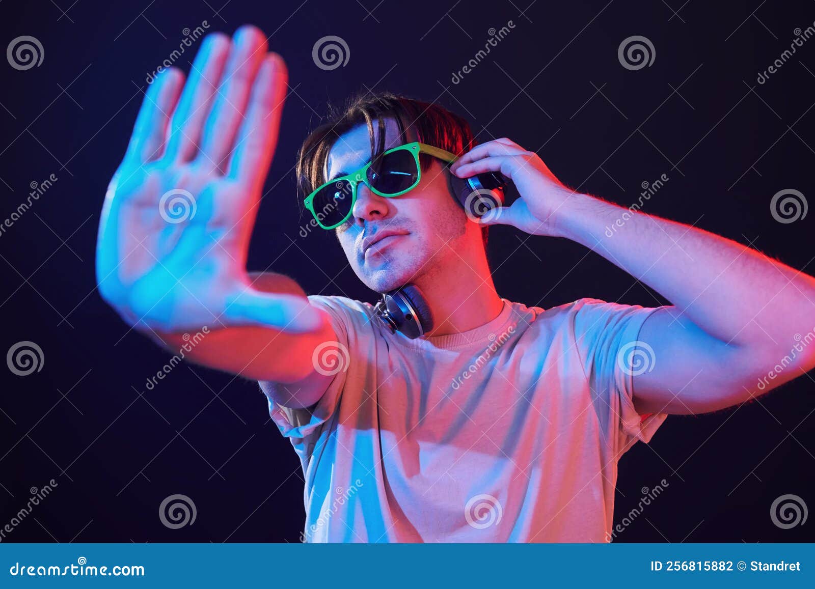 Man Standing in the Studio with Neon Light Stock Photo - Image of ...