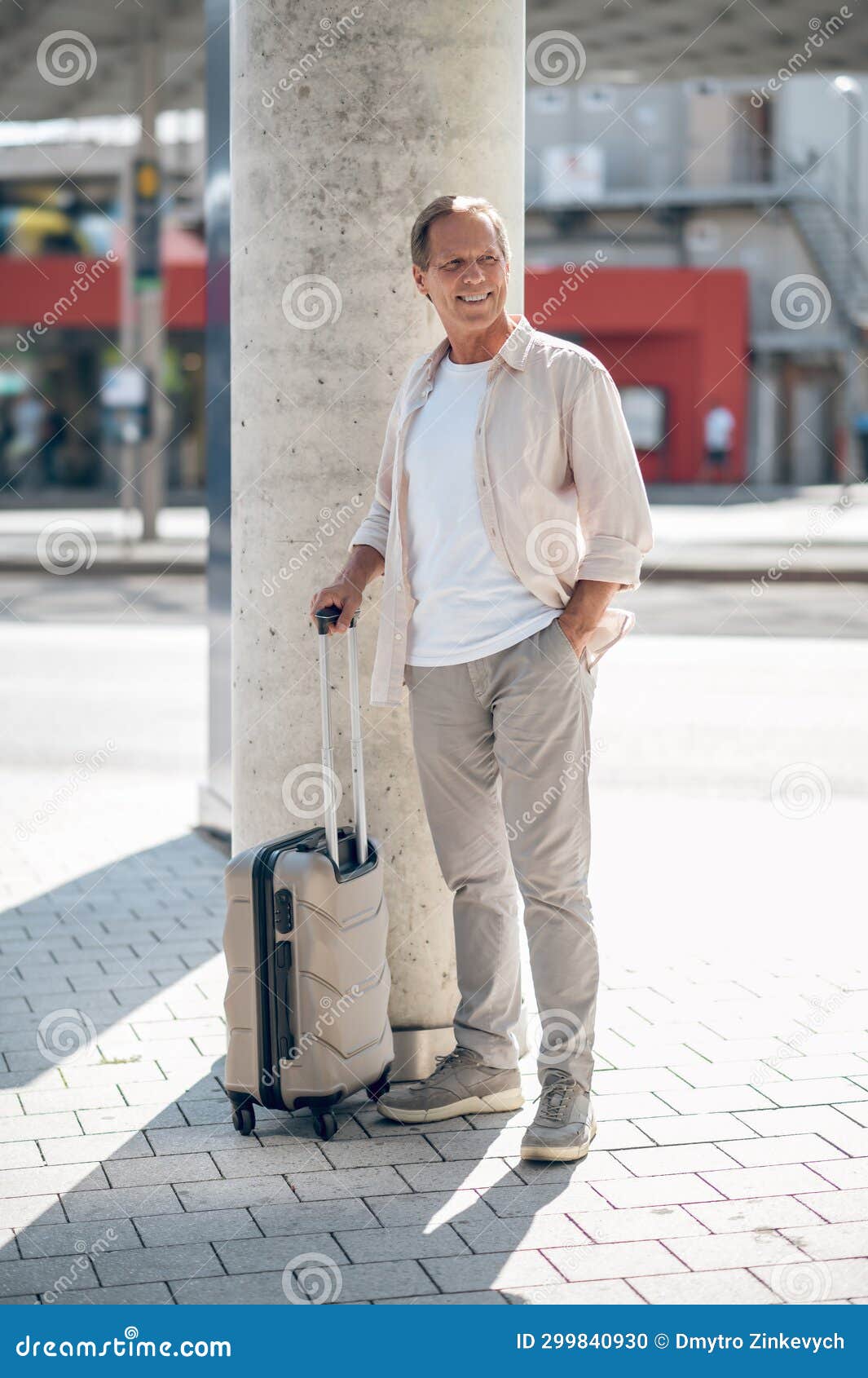 Man Standing with Suitcase in the City Street. Stock Photo - Image of ...