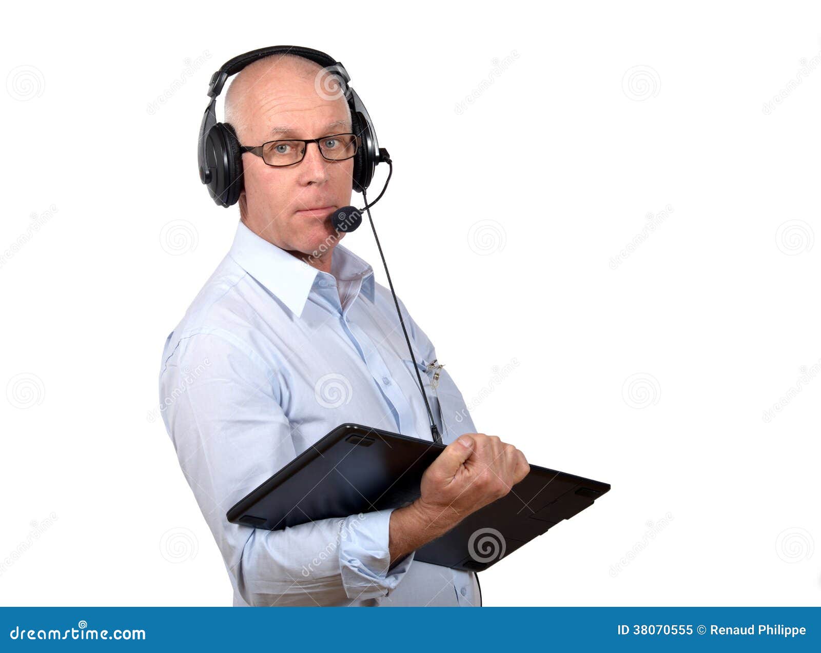 Man standing with a tablet stock image. Image of shirt - 38070555