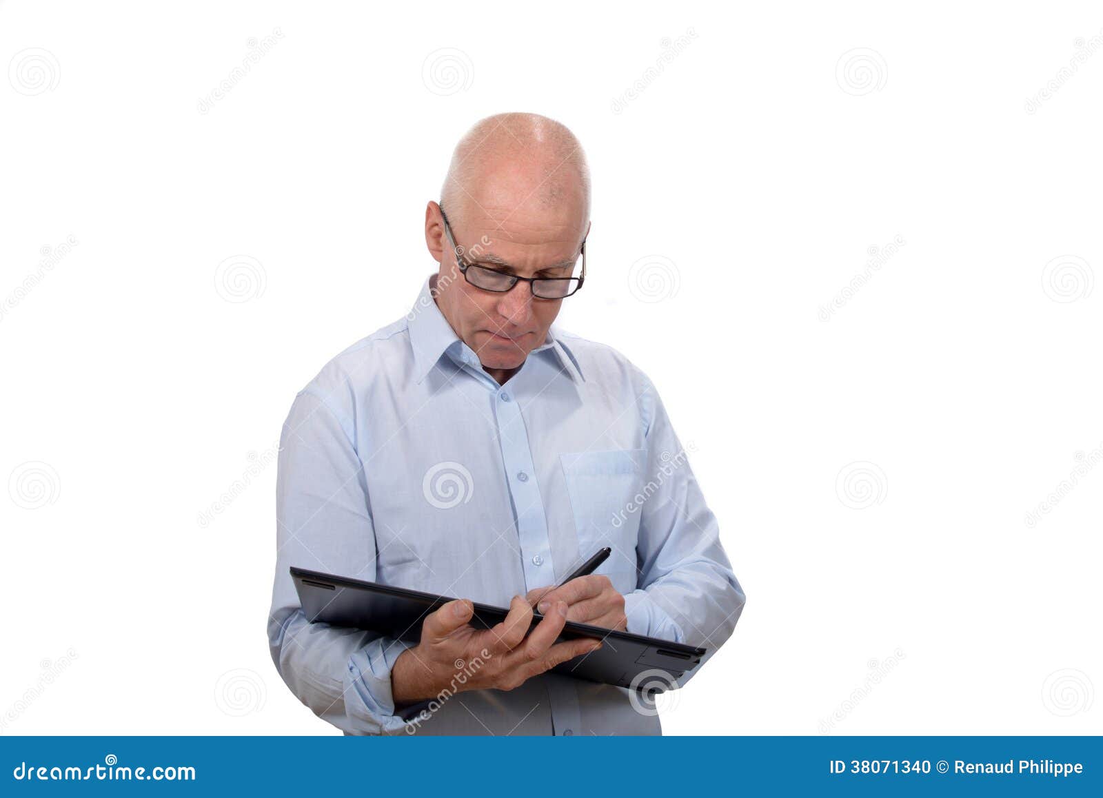 Man standing with a tablet stock photo. Image of standing - 38071340
