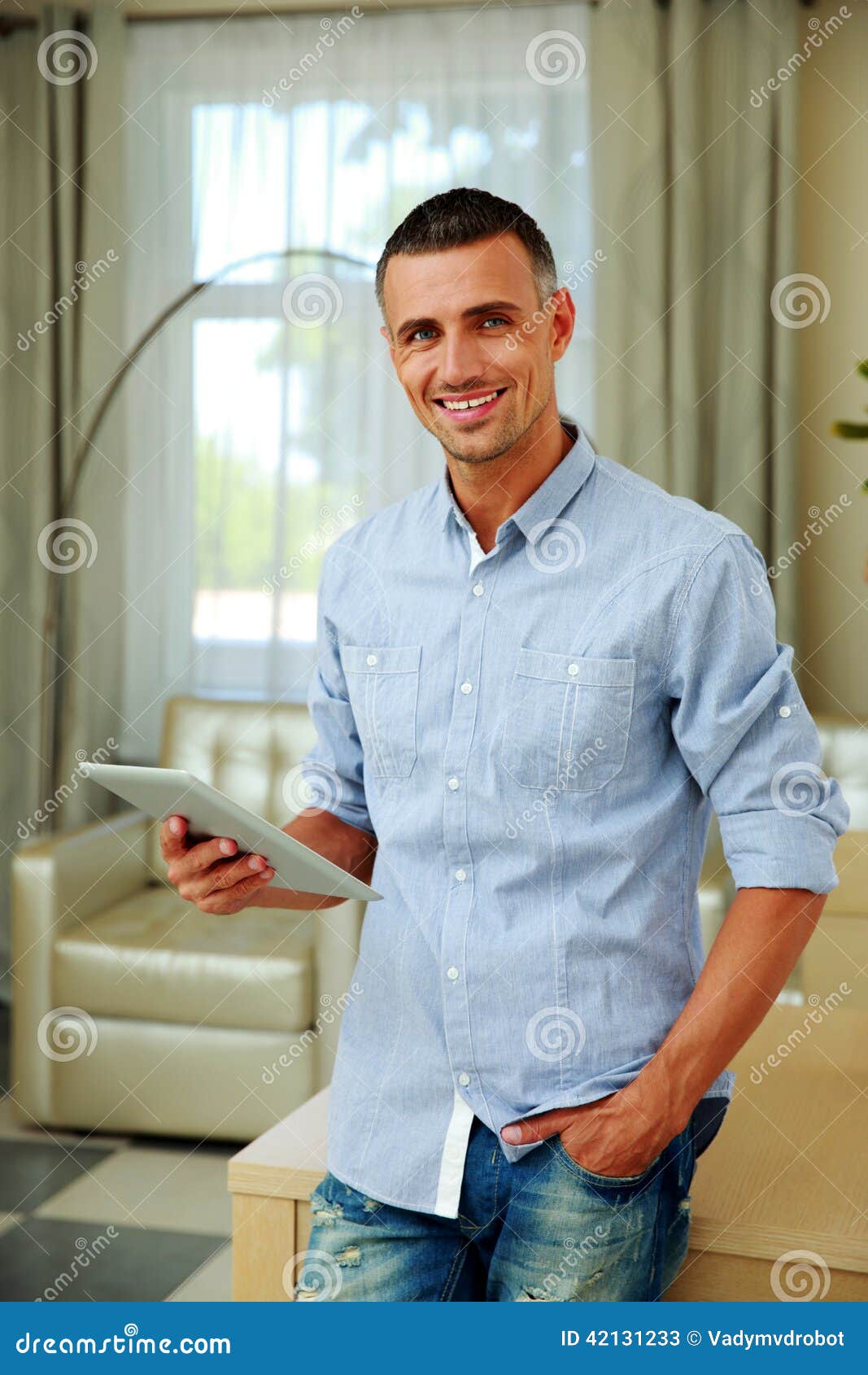 Man Standing with Tablet Computer at Home Stock Image - Image of ...