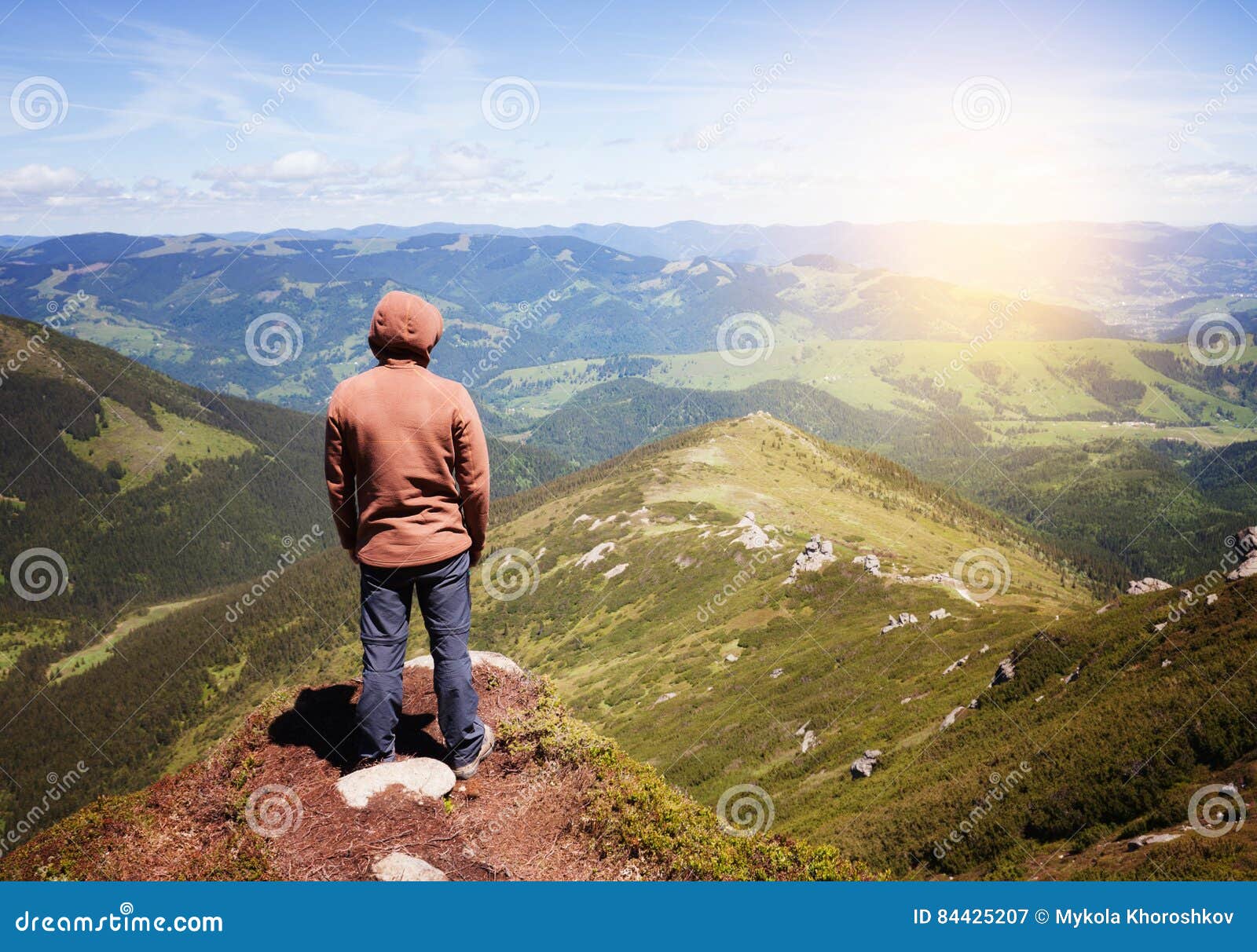 Man Standing on the Top of the Mountain Stock Image - Image of stone ...