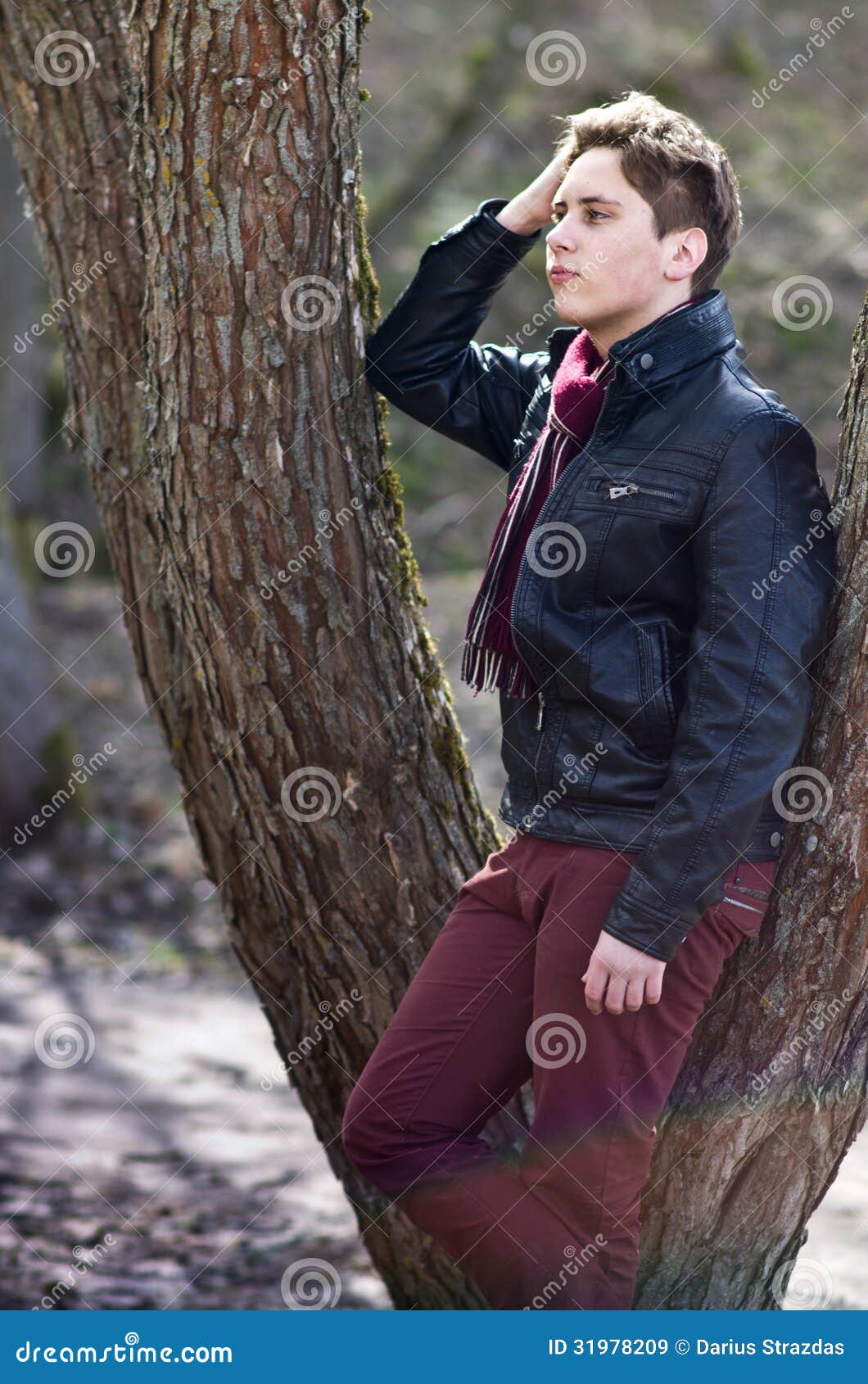 Man Standing at Tree Outdoor Stock Image - Image of goodlooking, color ...