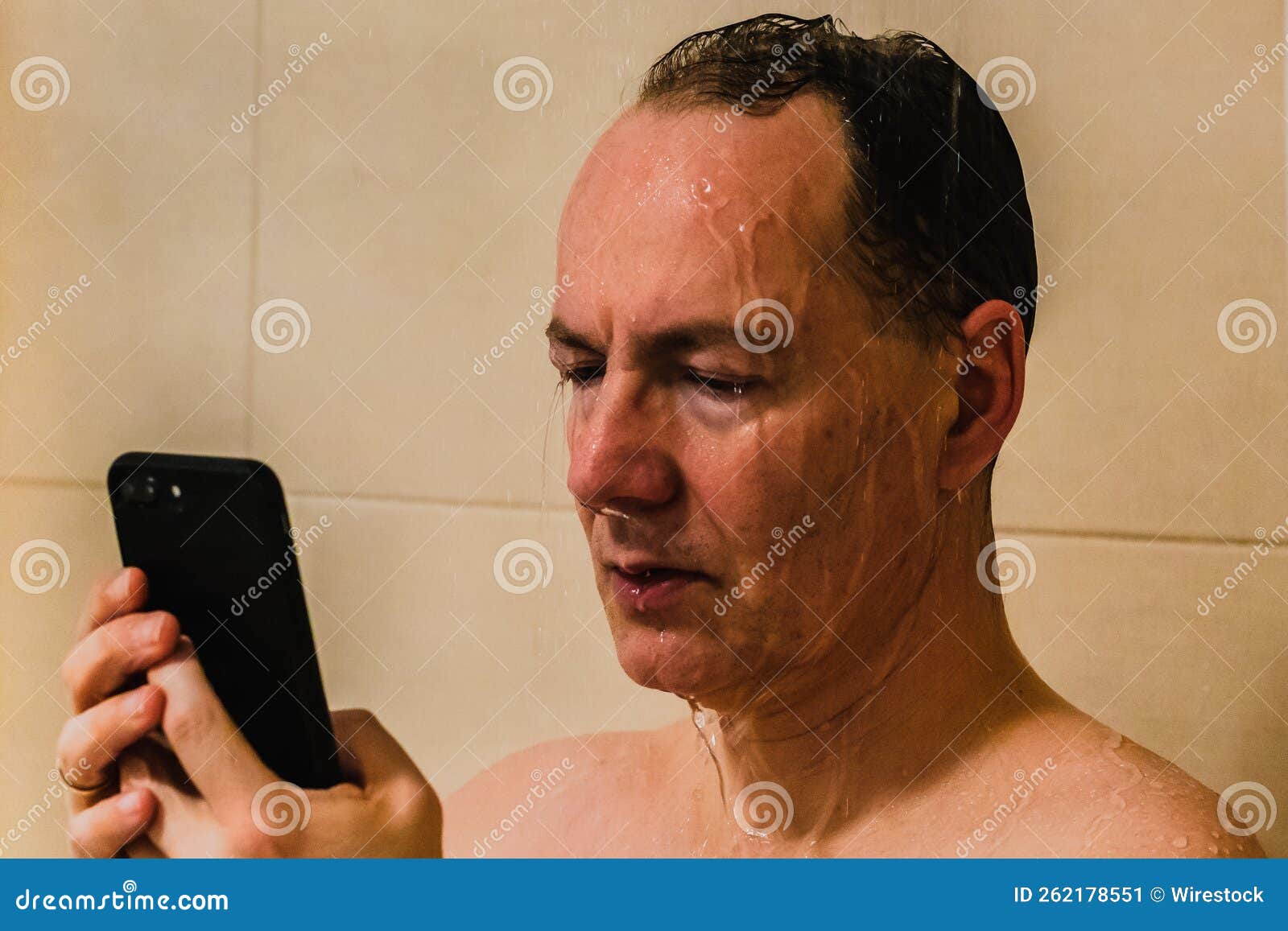 Man Standing Under A Shower With A Mobile Phone In His Hand Stock Image Image Of Smart