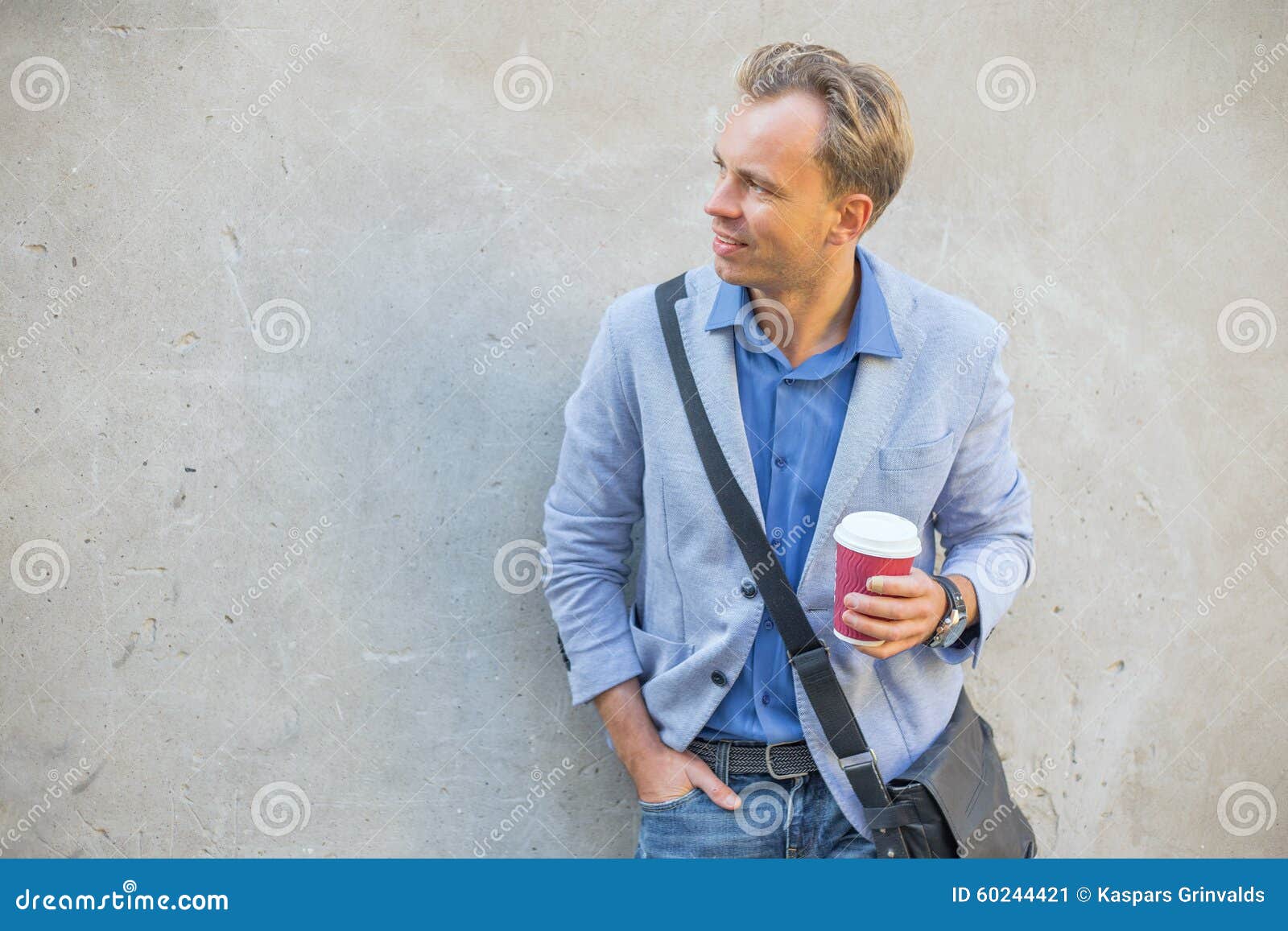 Man standing by the wall stock image. Image of person - 60244421