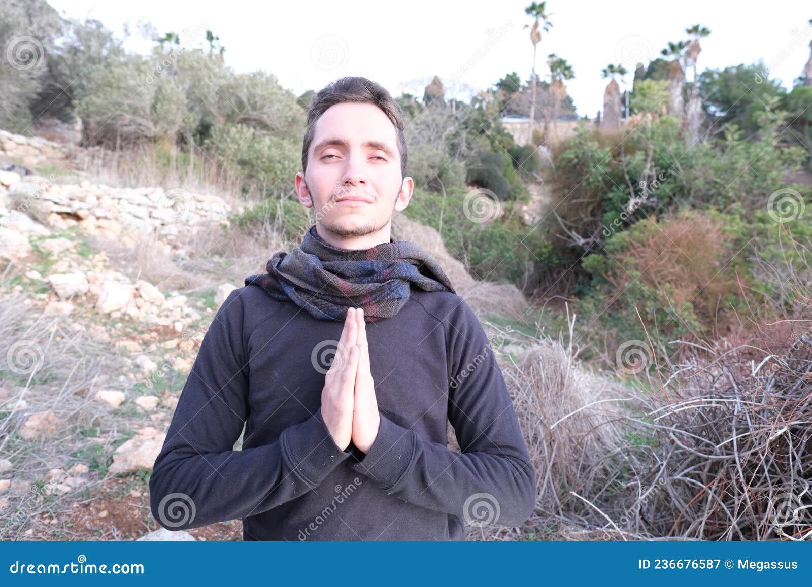 Man praying outside stock image. Image of praying, hands - 236676587