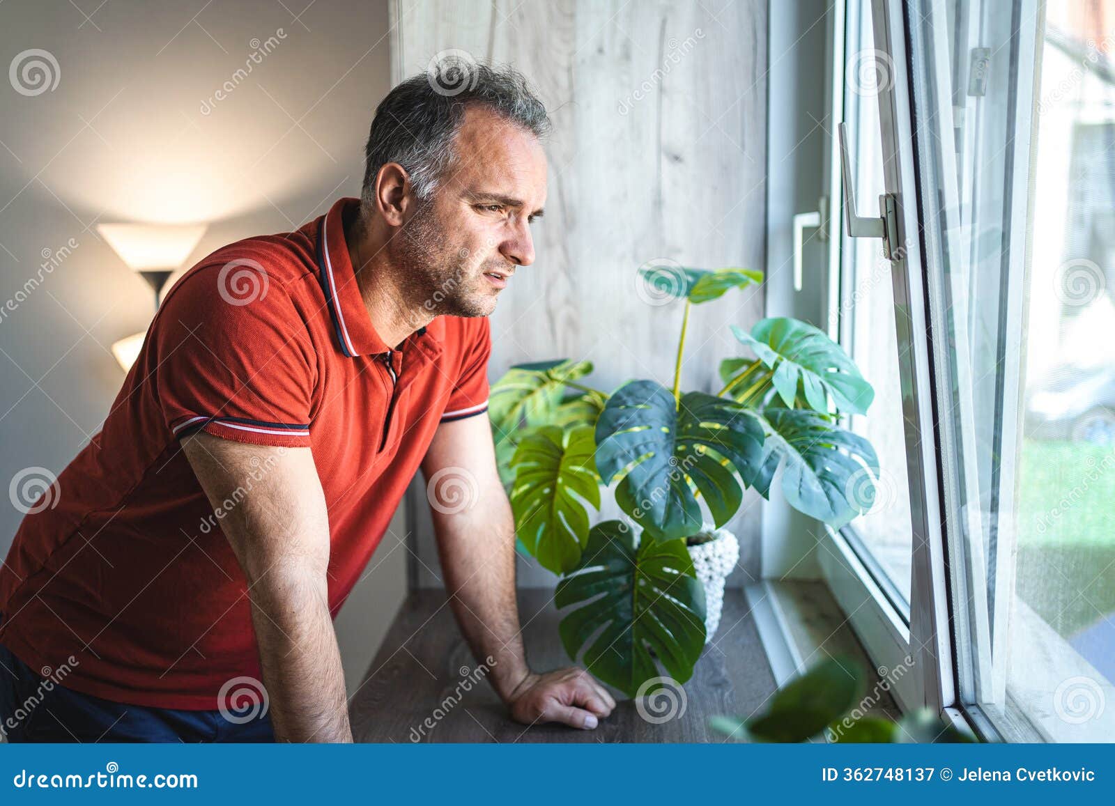 Distraught Man Standing In Front Of A Wall Of Question Marks Stock ...