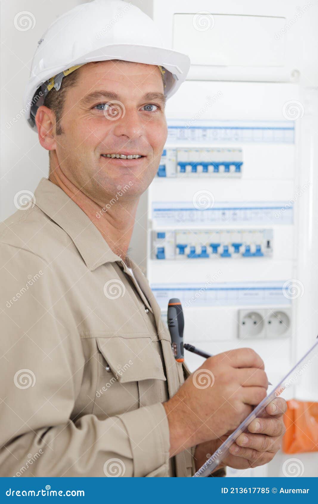 Man Standing and Writing on Clipboard Stock Image - Image of tool ...