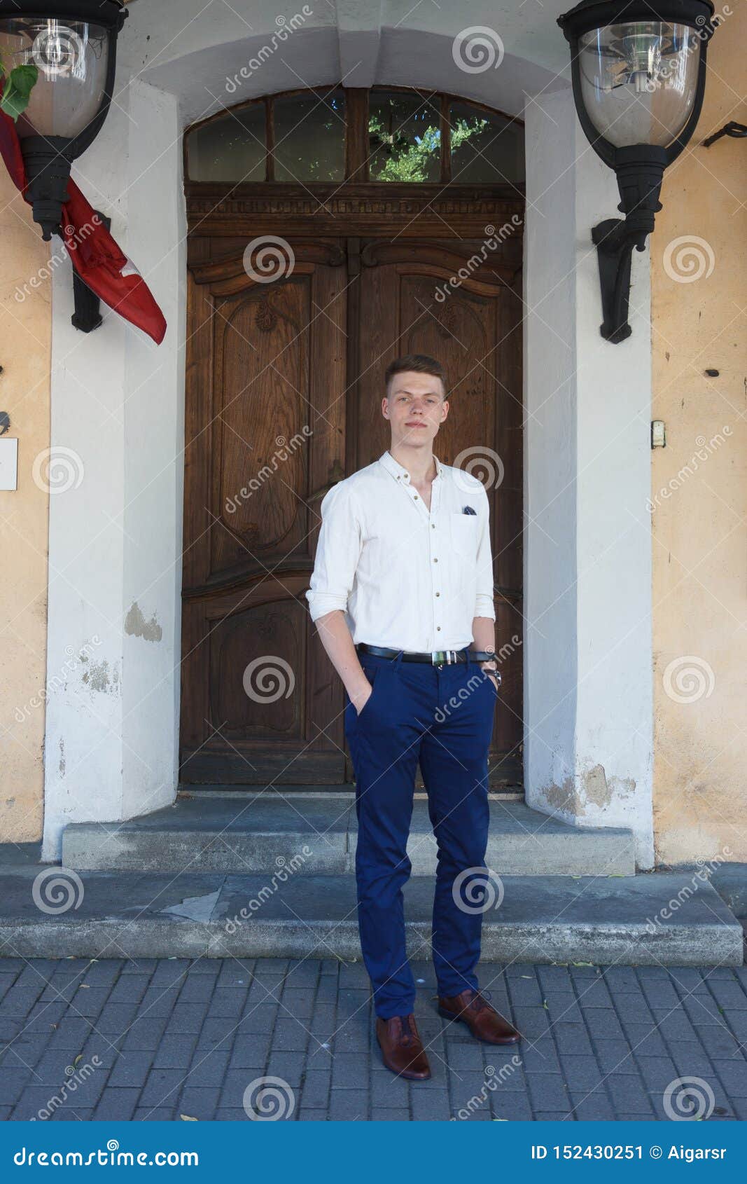 Man Stands Outside by the Door Stock Image - Image of standing, style ...