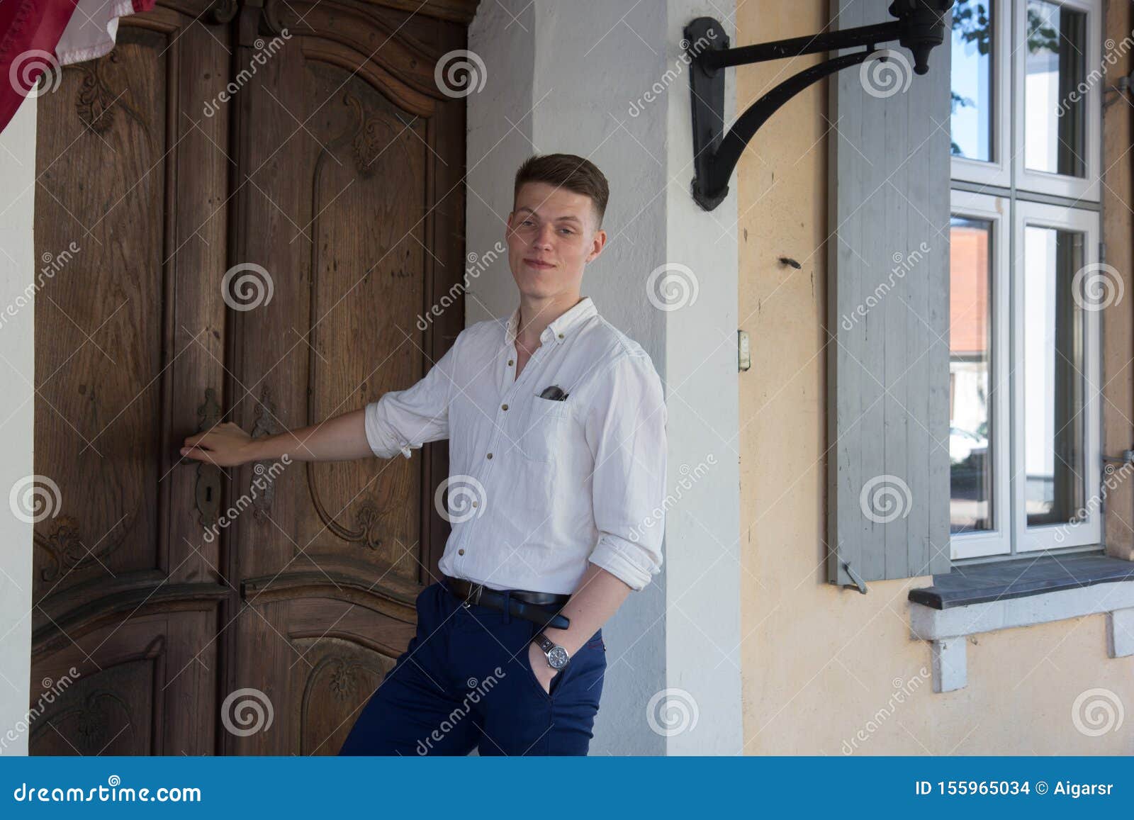Man Stands Outside by the Door Stock Photo - Image of fashion ...