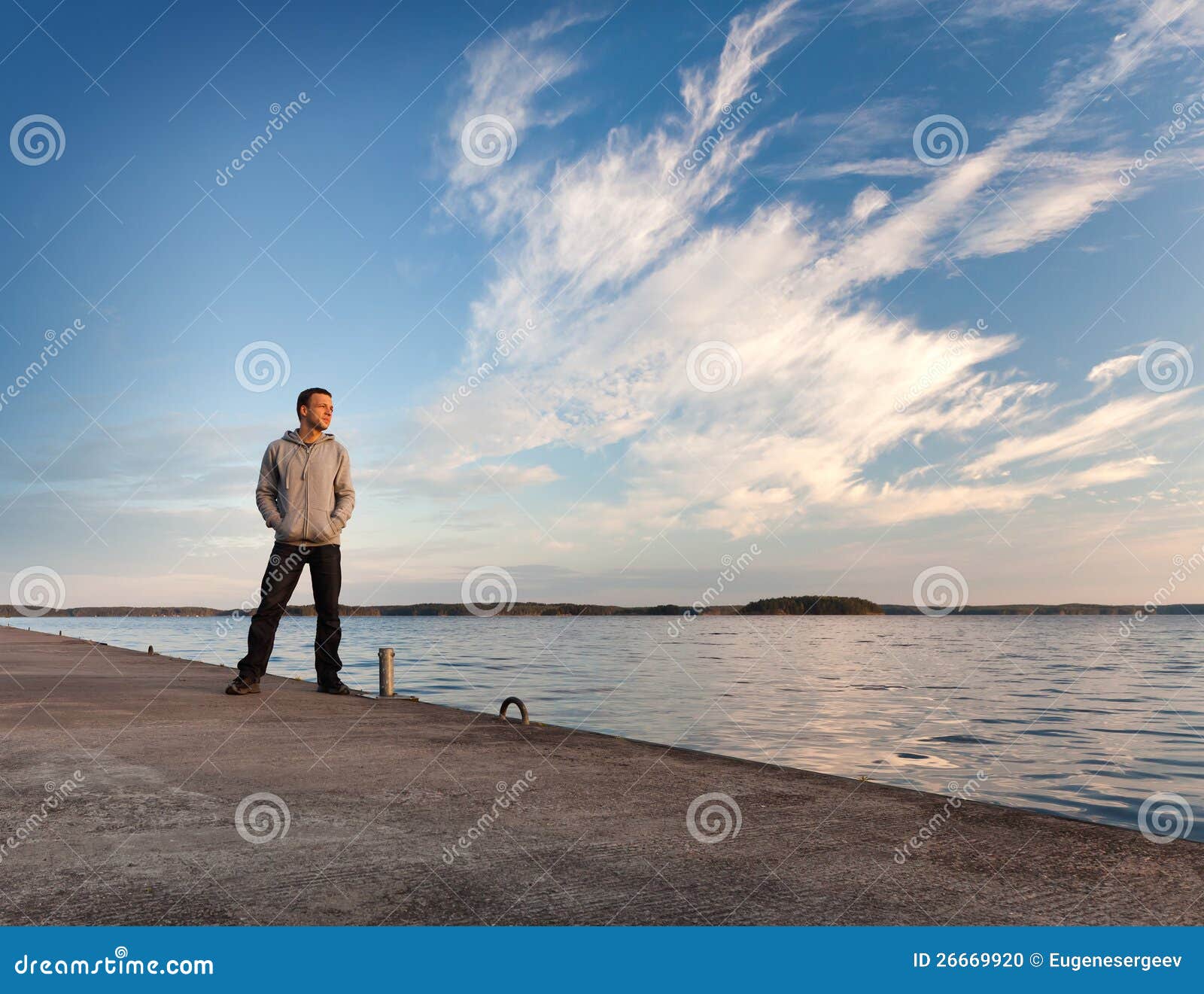 A Man Stands on the Pier Starring at the Sea Stock Photo - Image of ...