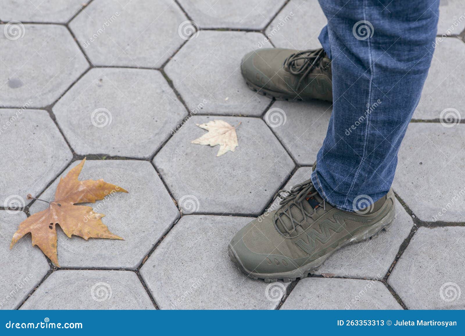 Man Stands on the Road Slabs Stock Image - Image of floor, feet: 263353313