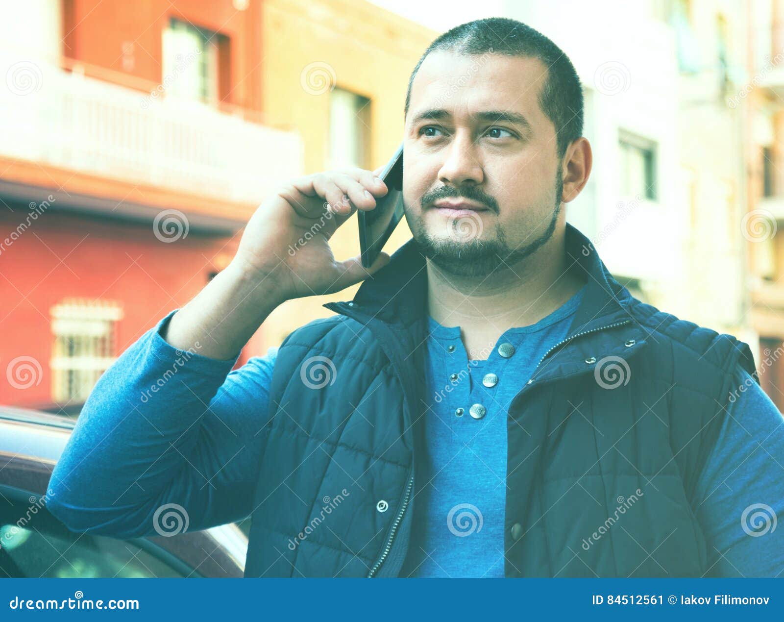 Man Stands on Street and Talking on Smartphone Stock Image - Image of ...