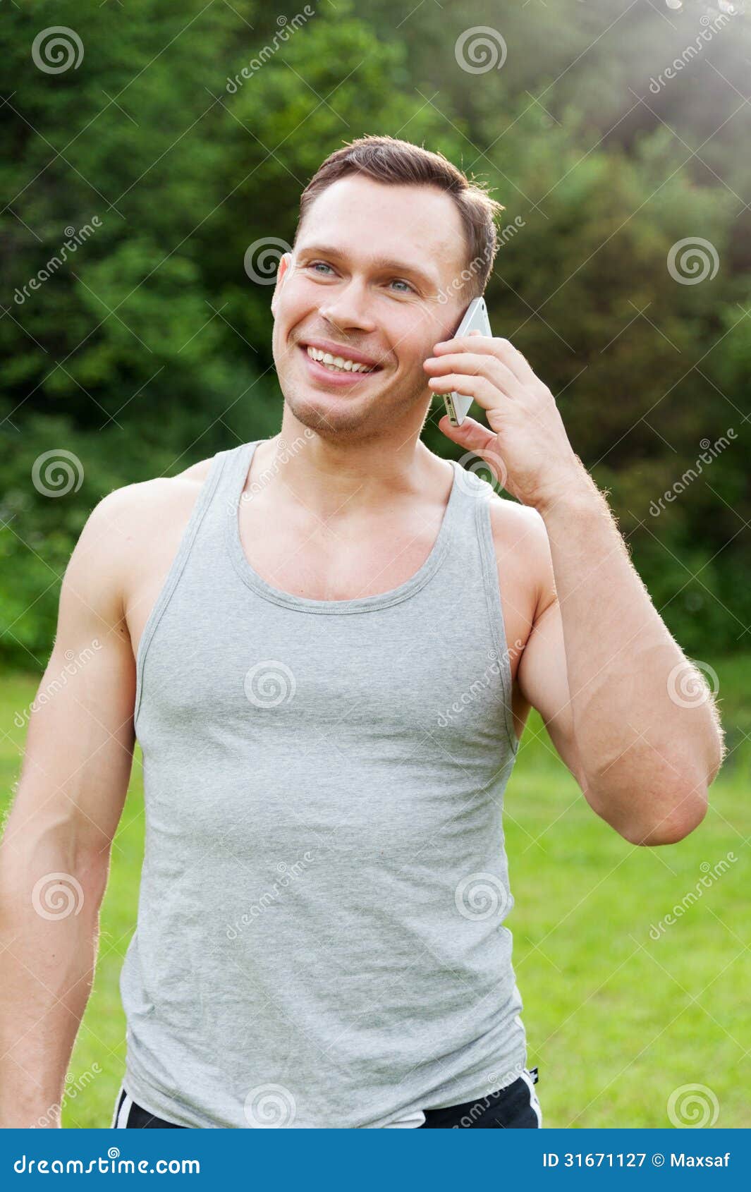 Man Stands with a Telephone in the Park Stock Image - Image of male ...