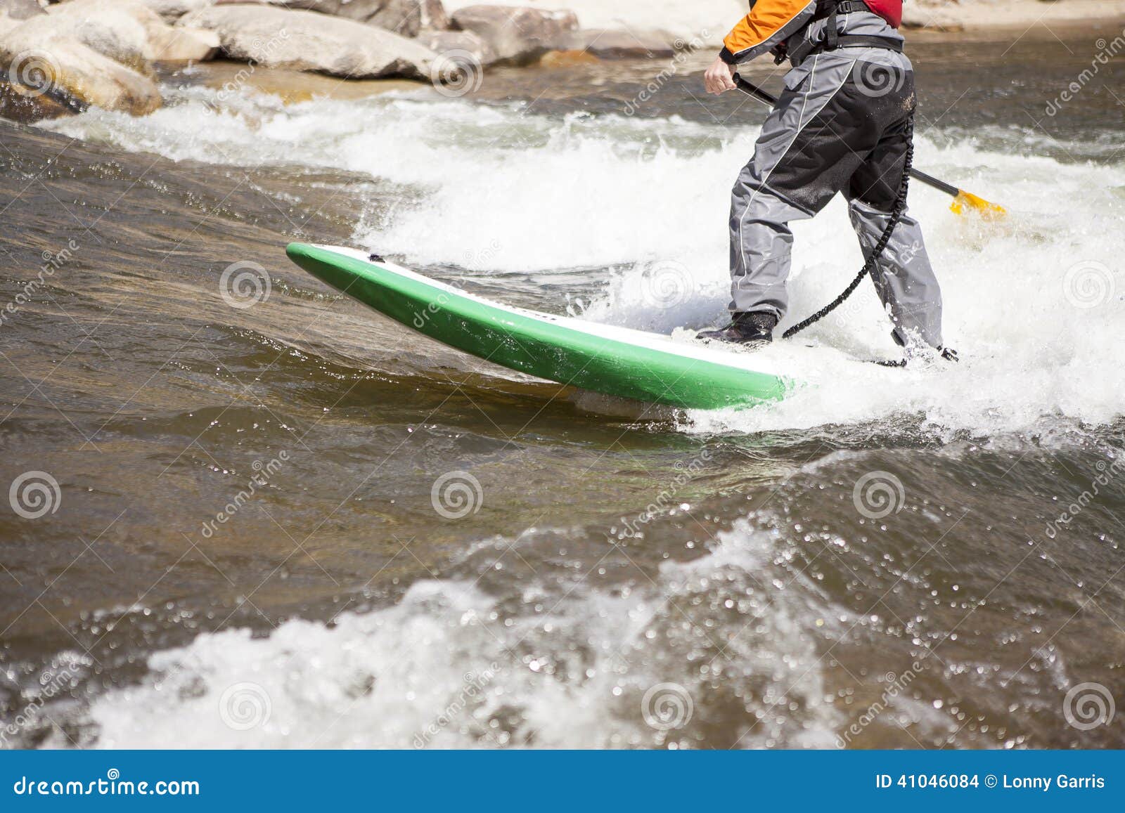 Man on Standup Paddle Board on a Fast River. Stock Photo - Image of ...