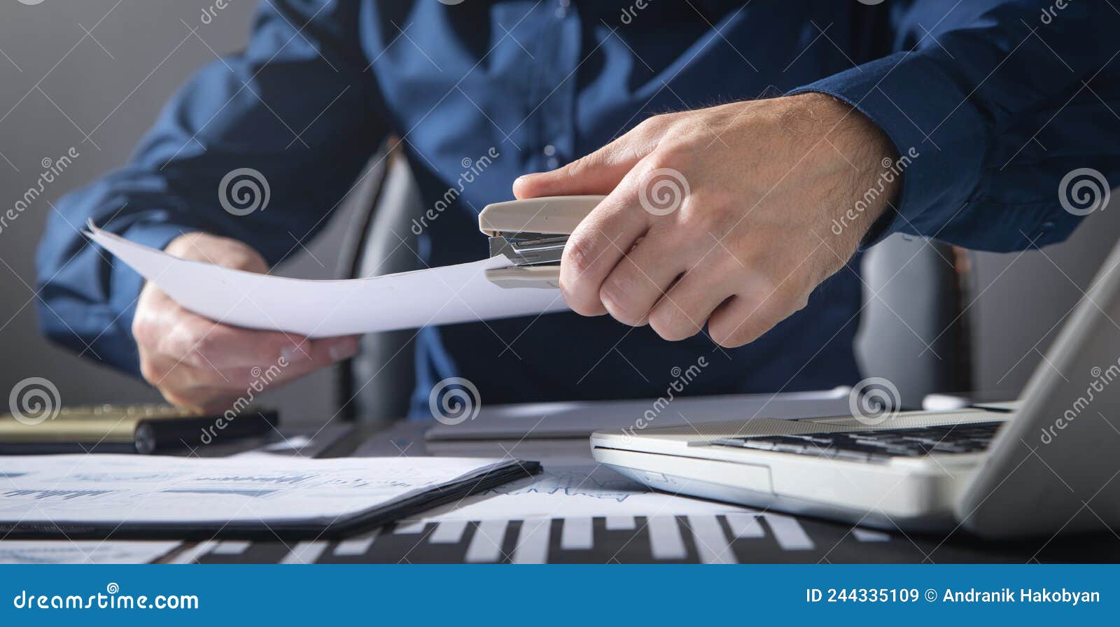 A Stapler And The Documents Files In Office On The Table, Staple The ...