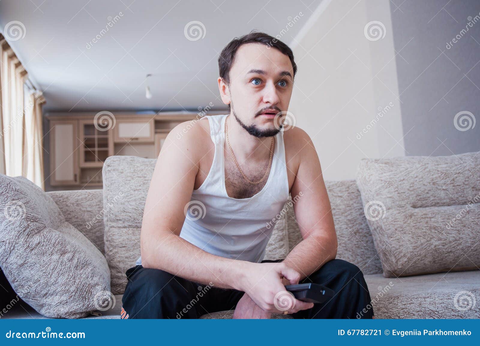 Man stares the TV stock image. Image of technology, activities - 67782721
