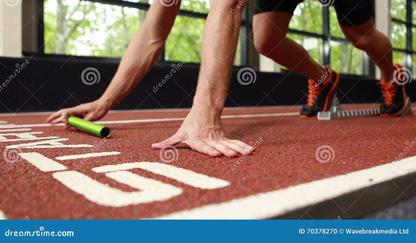 Man starting relay running stock footage. Video of exercising - 70378270