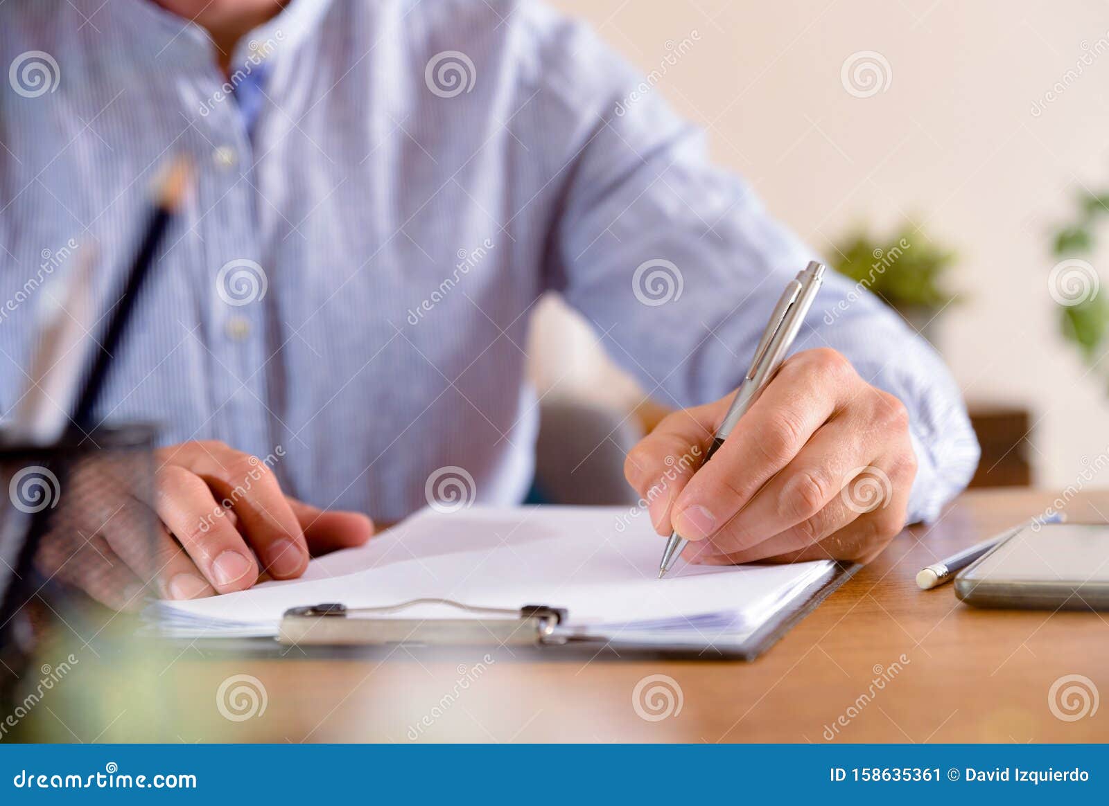 Man Starting To Write on Empty Sheet Front View Stock Image - Image of ...