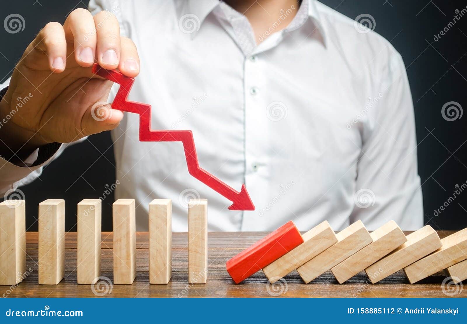 A Man Starts a Chain Reaction of Falling Dominoes. Start Running ...