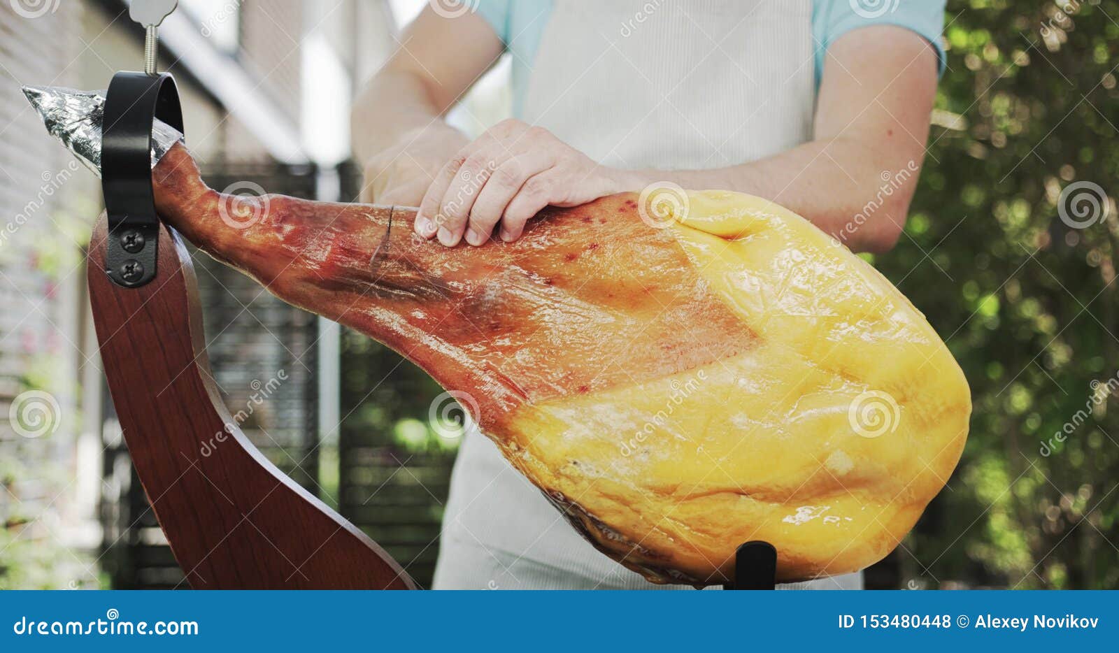 A Man Starts Cutting the Whole Jamon Leg Stock Photo - Image of jamon ...