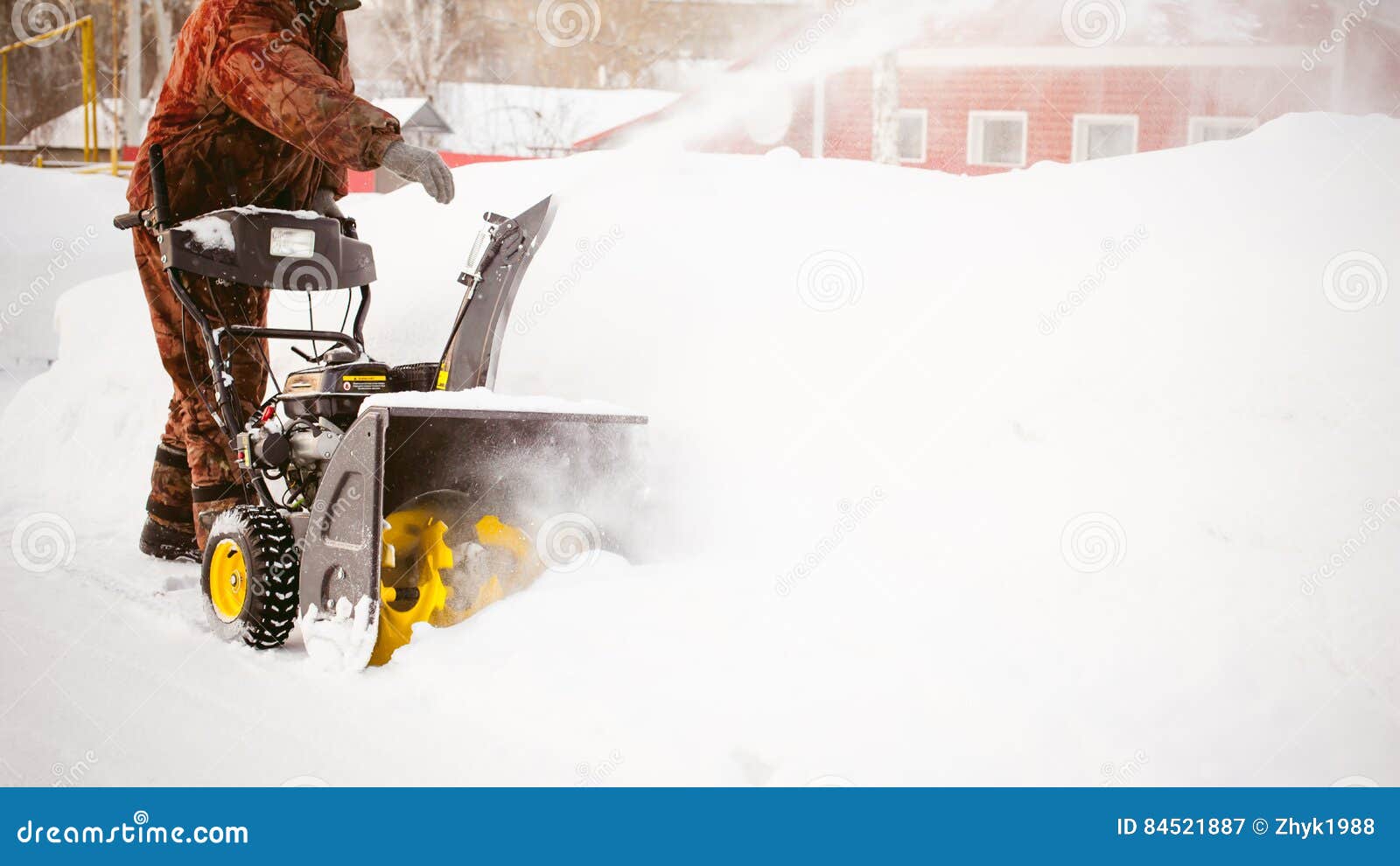 Man Starts Engine Snow Blower Stock Image | CartoonDealer.com #84522187