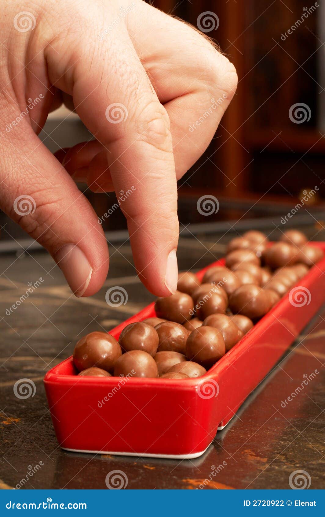 Man Stealing Chocolate Balls Stock Photo - Image of caucasian, bunch ...