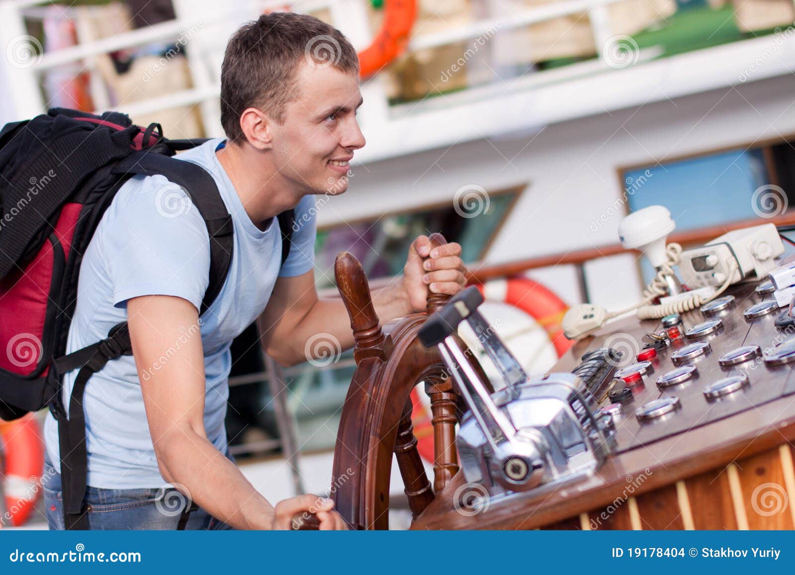 Man is steering the helm stock photo. Image of helm, hand - 19178404