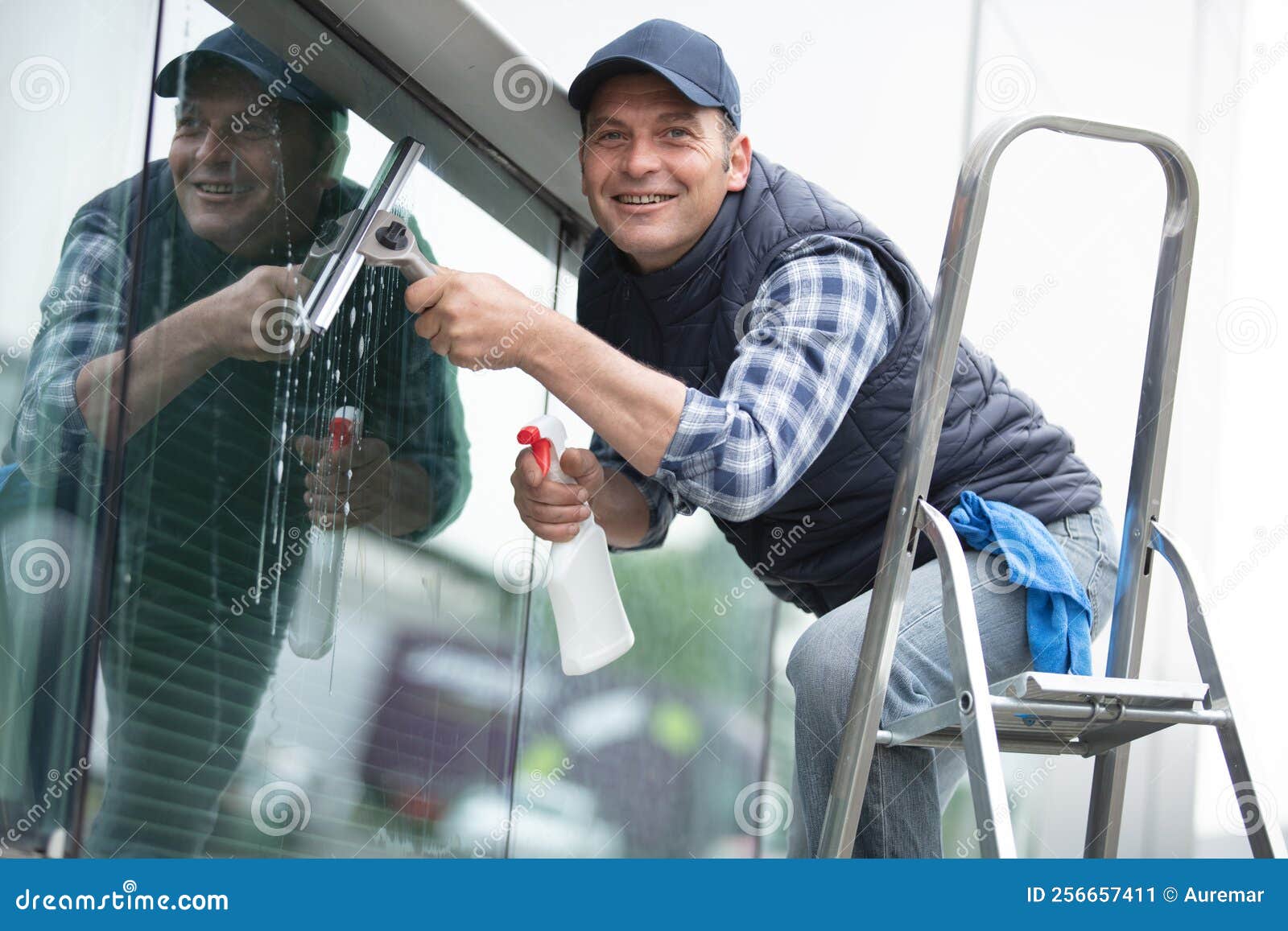 Man on Stepladder Washing Window Outdoors Stock Image - Image of ...