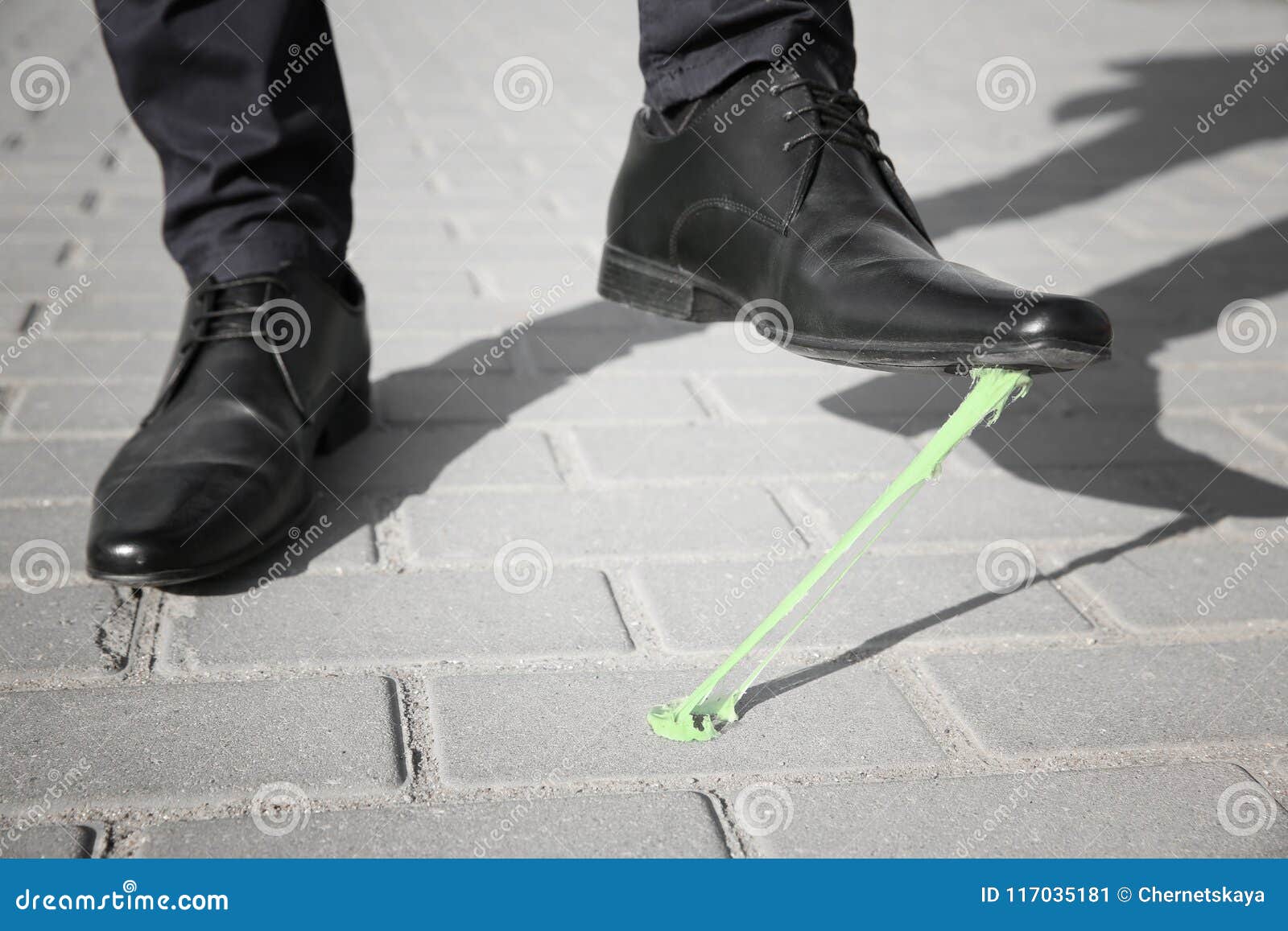 Man Stepping in Chewing Gum on Sidewalk. Stock Image - Image of person ...