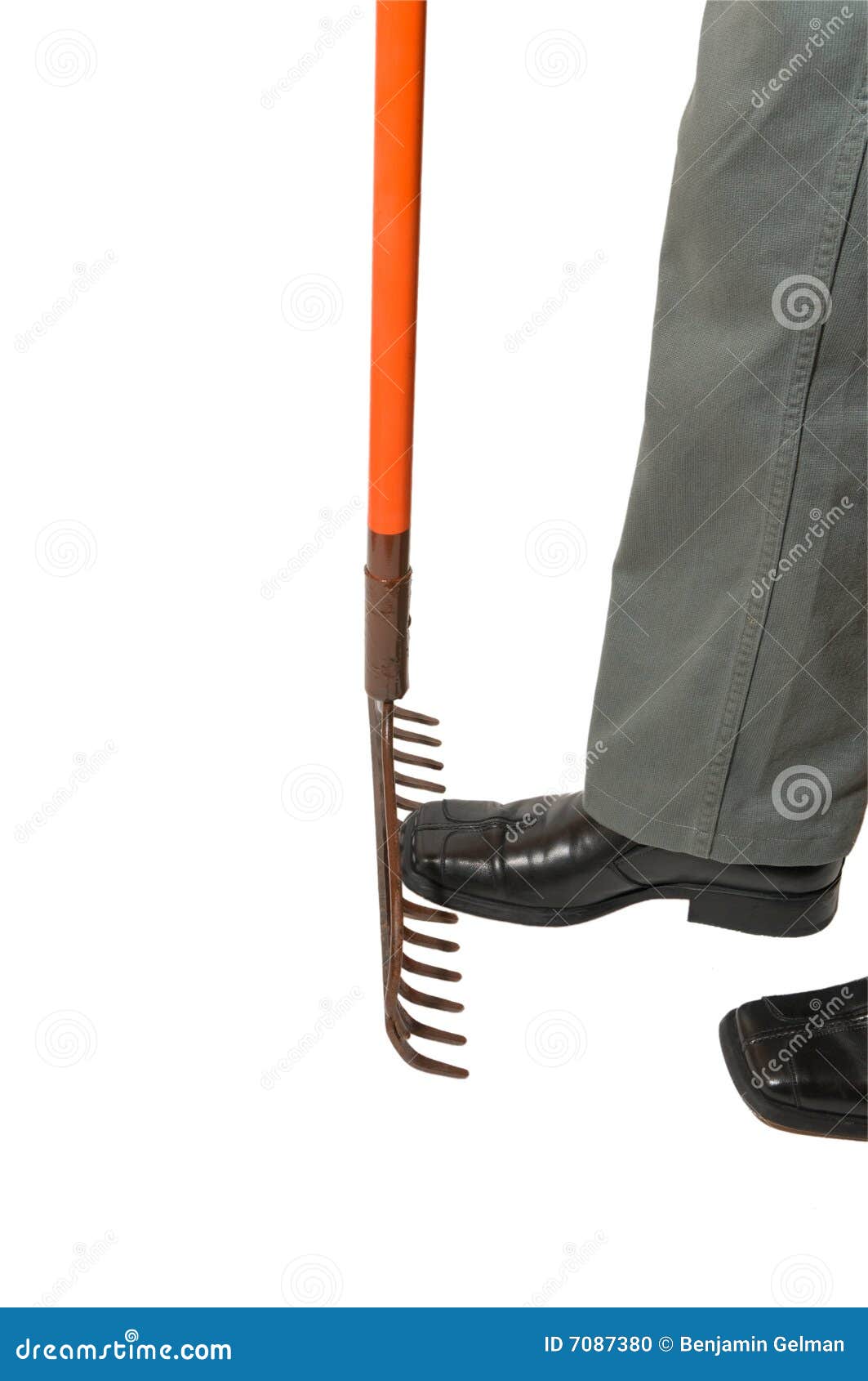 Man stepping on rake stock photo. Image of manual, steel - 7087380