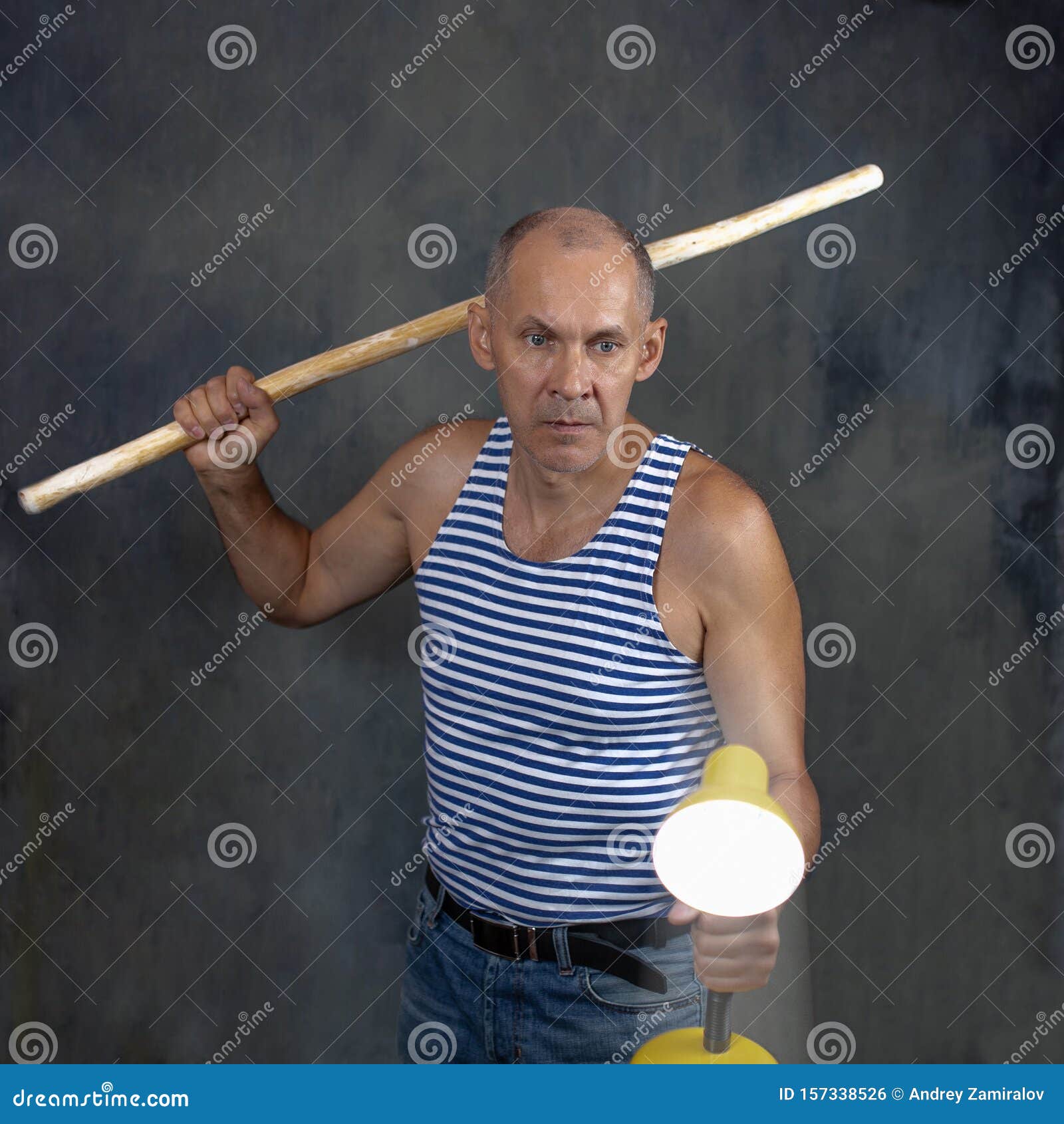 A man with a stick. stock photo. Image of fitness, shine - 157338526