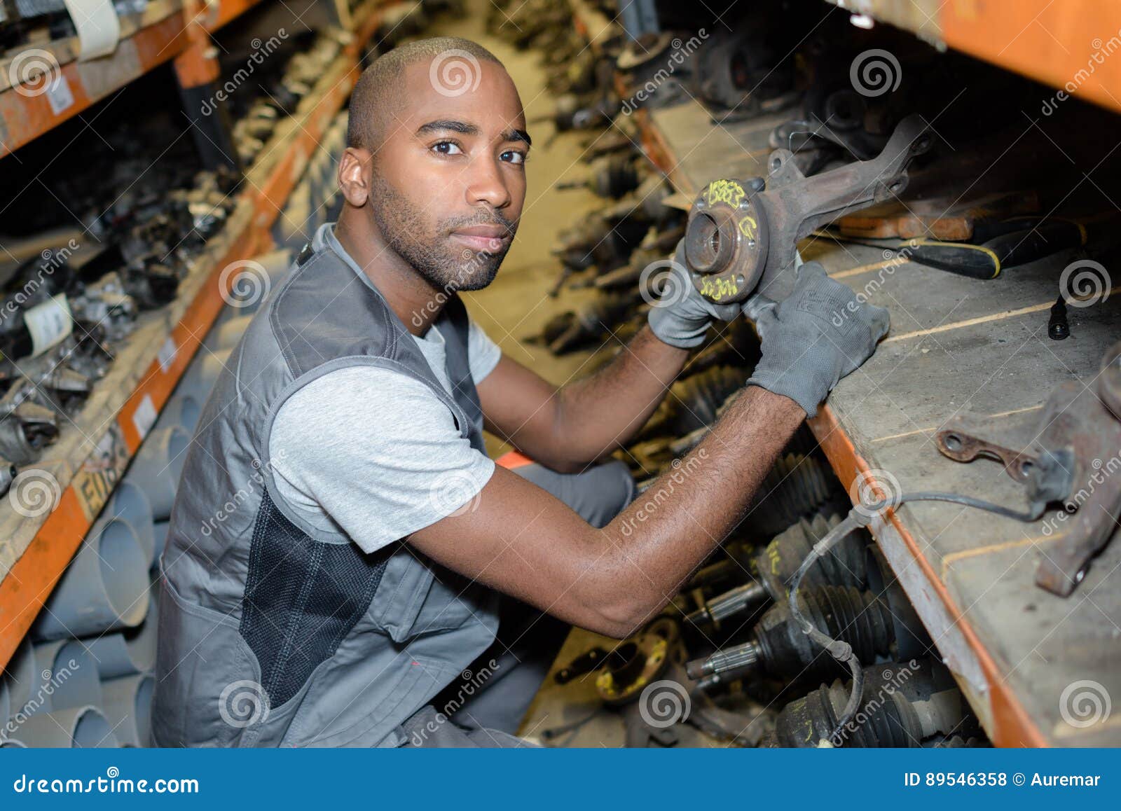 Man with Stock Second Hand Car Parts Stock Photo - Image of breakers ...