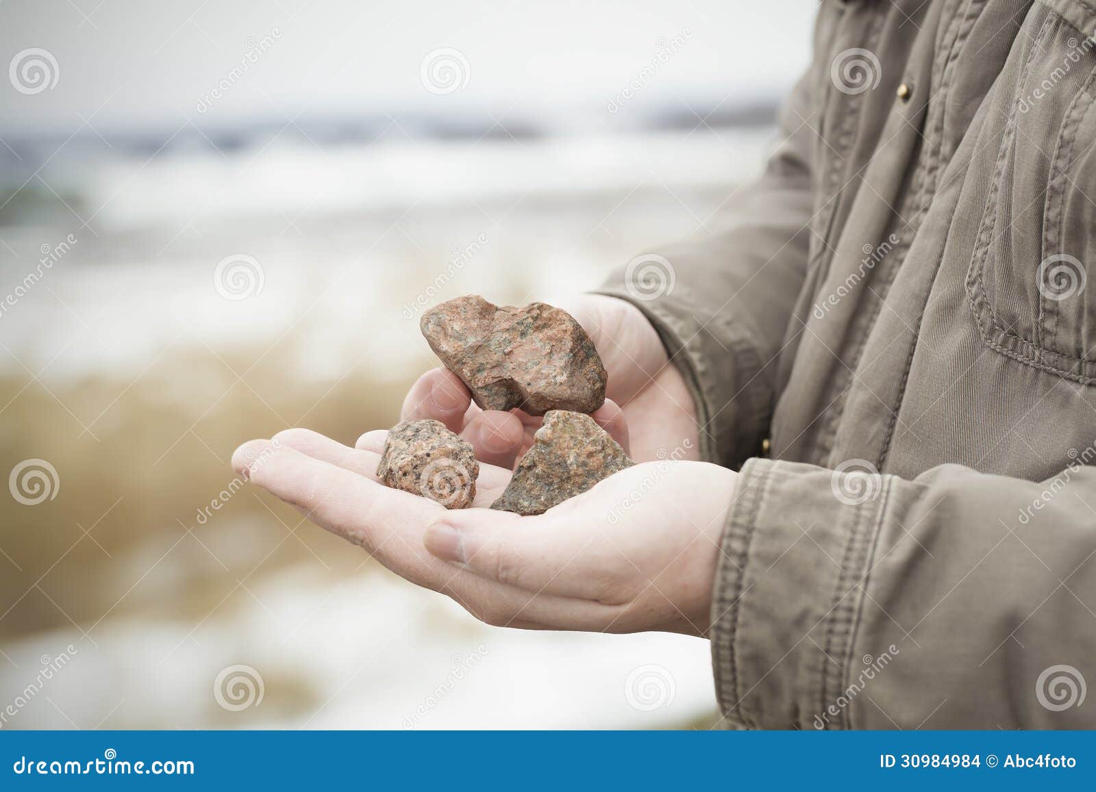 Man with stones stock photo. Image of collection, alien - 30984984