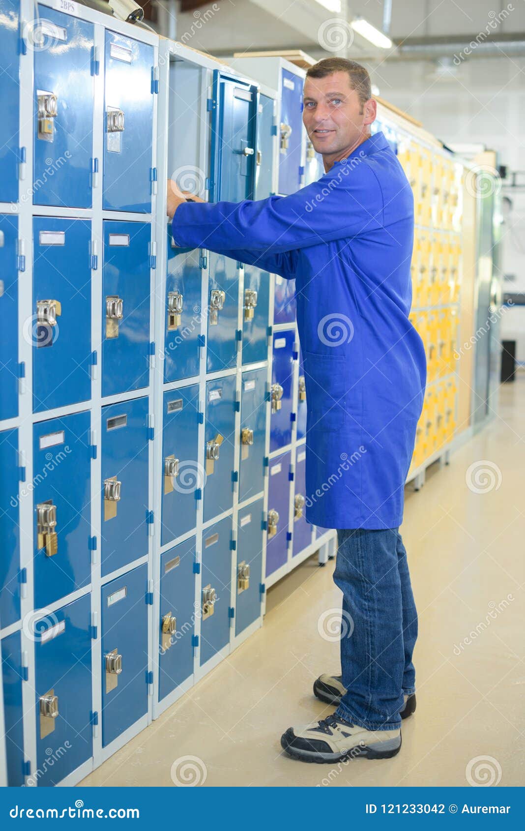 Man stood at locker stock photo. Image of smile, break - 121233042