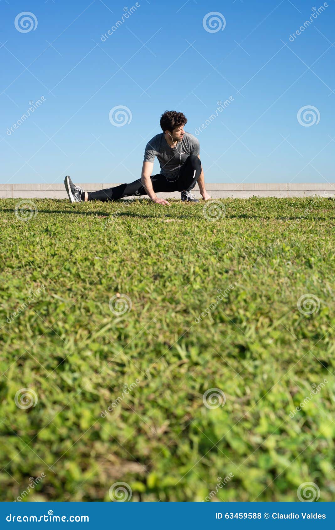 Man Stretches the Leg in the Ground Stock Photo - Image of strechings ...