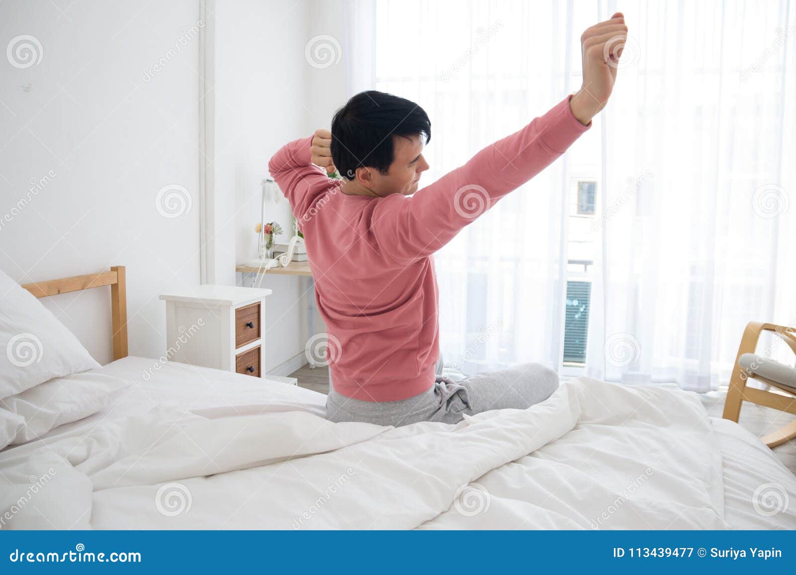 Man Stretching on Bed after Waking Up Stock Image - Image of caucasian ... Man Stretching on Bed after Waking Up Stock Image - Image of caucasian ...