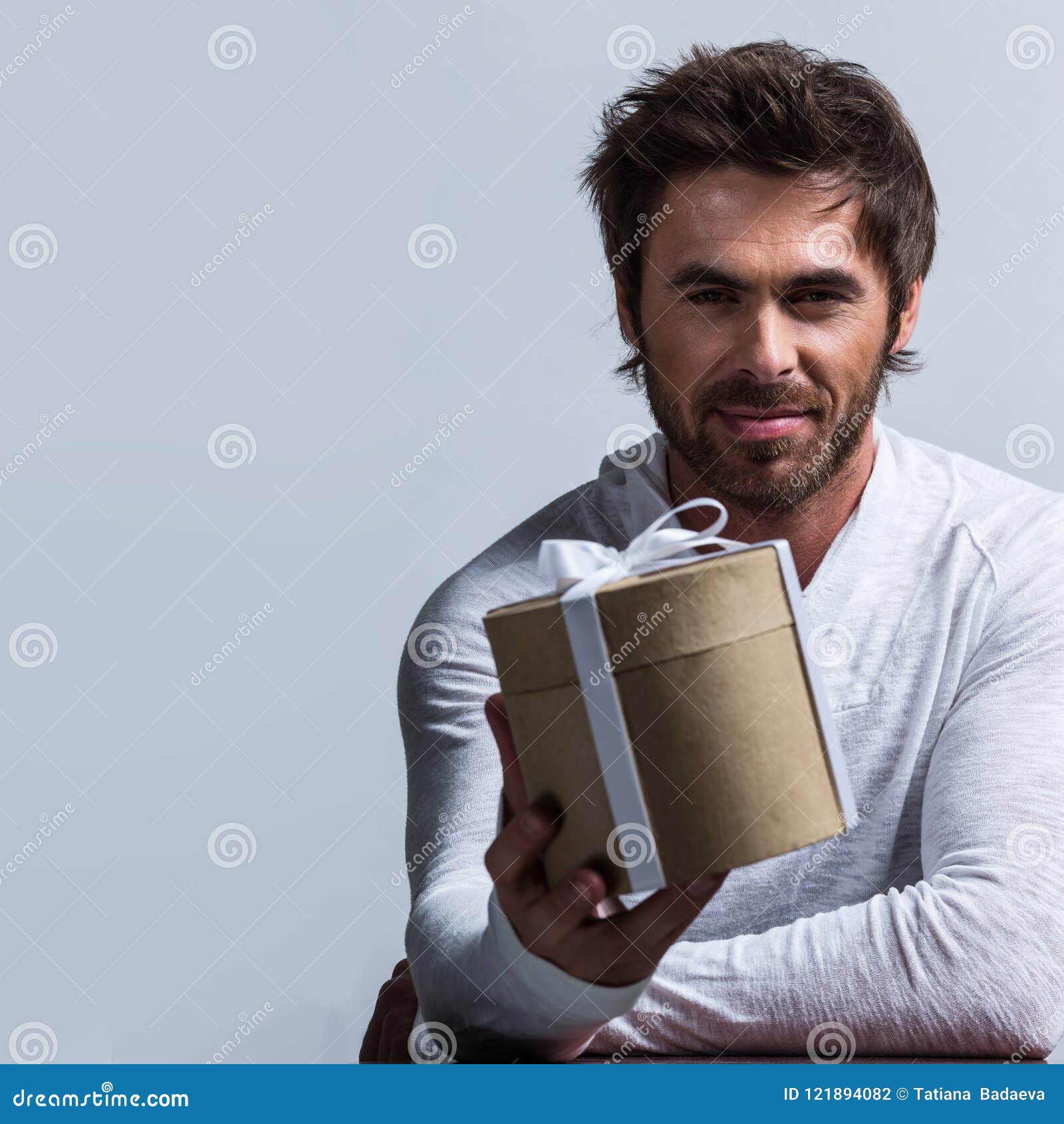 Man Stretching Out a Gift Box Stock Photo - Image of white, love: 121894082