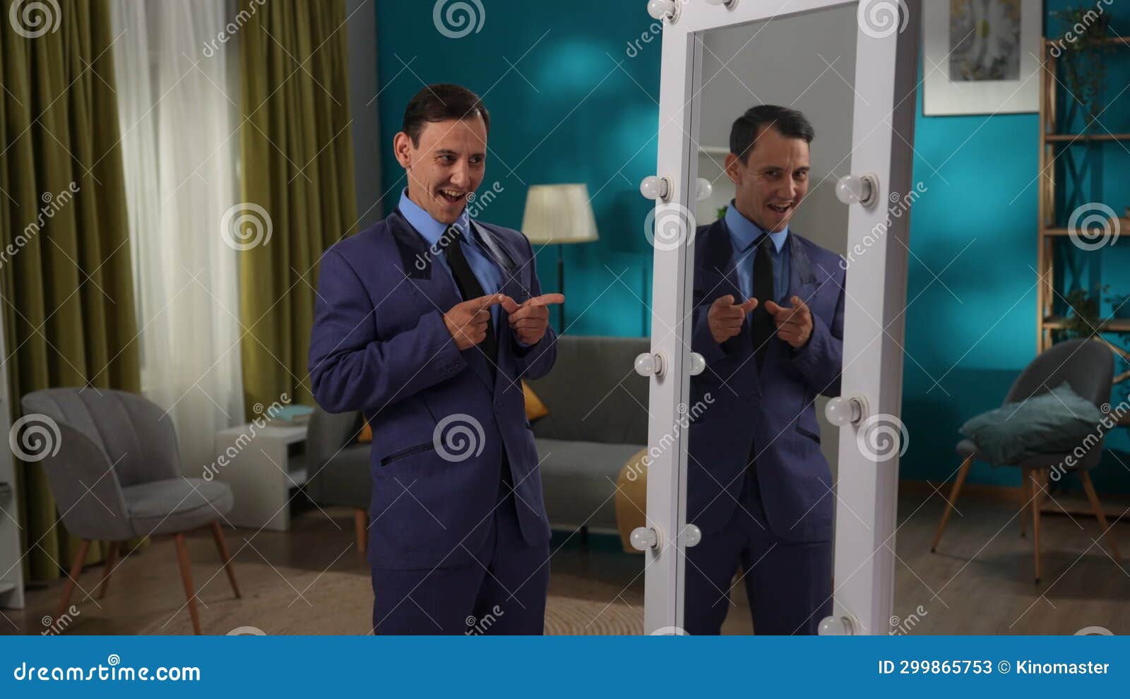 A Man in a Strict Suit is Standing in the Living Room in Front of a ...
