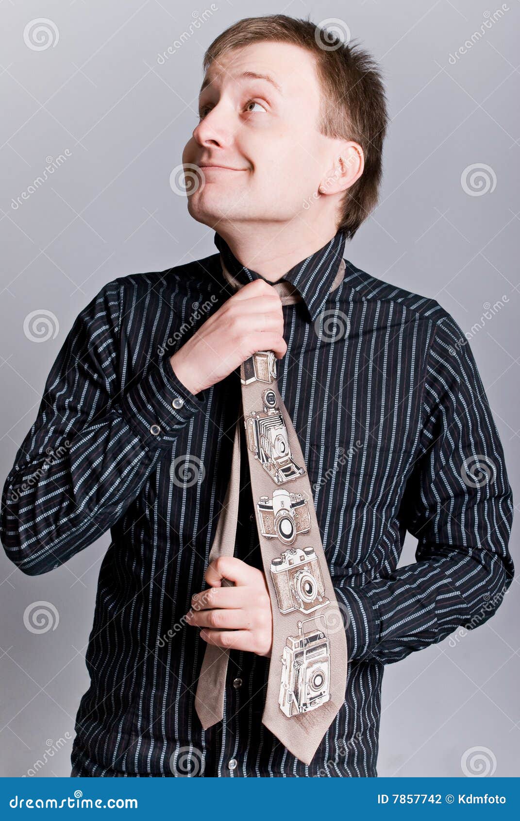 A man strings a tie stock photo. Image of face, studio - 7857742