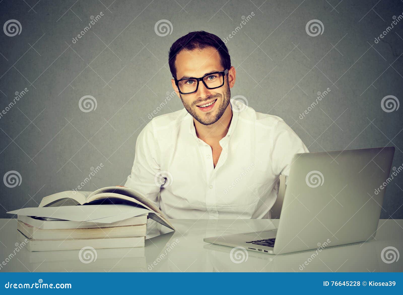 Man Student Using Notebook and Reading Books Stock Photo - Image of ...