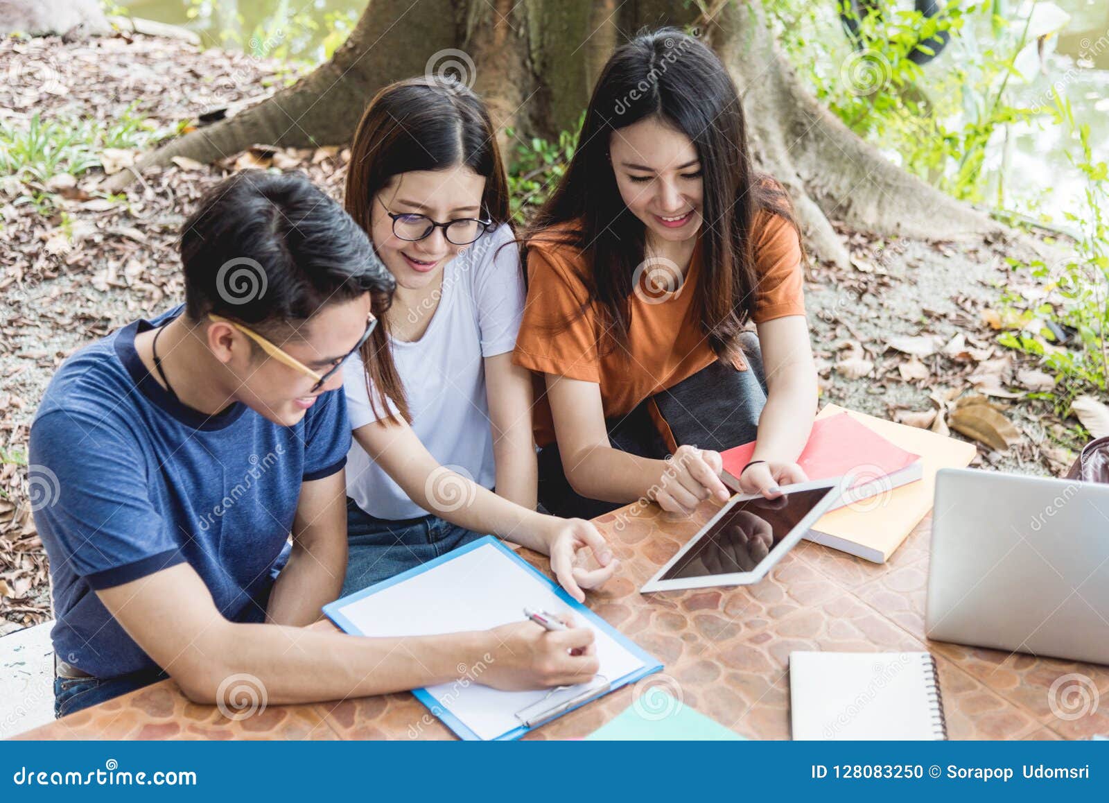 Man Students and Girlfriend are Consult Information from Compute Stock ...