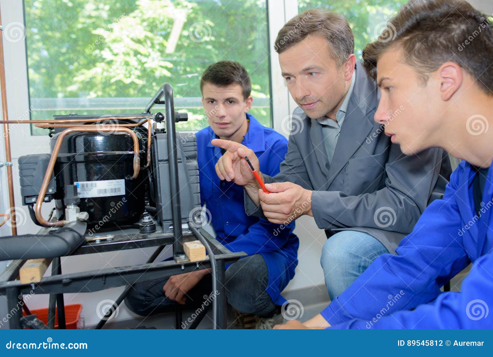 Man and Students Looking at Invention Stock Photo - Image of invention ...