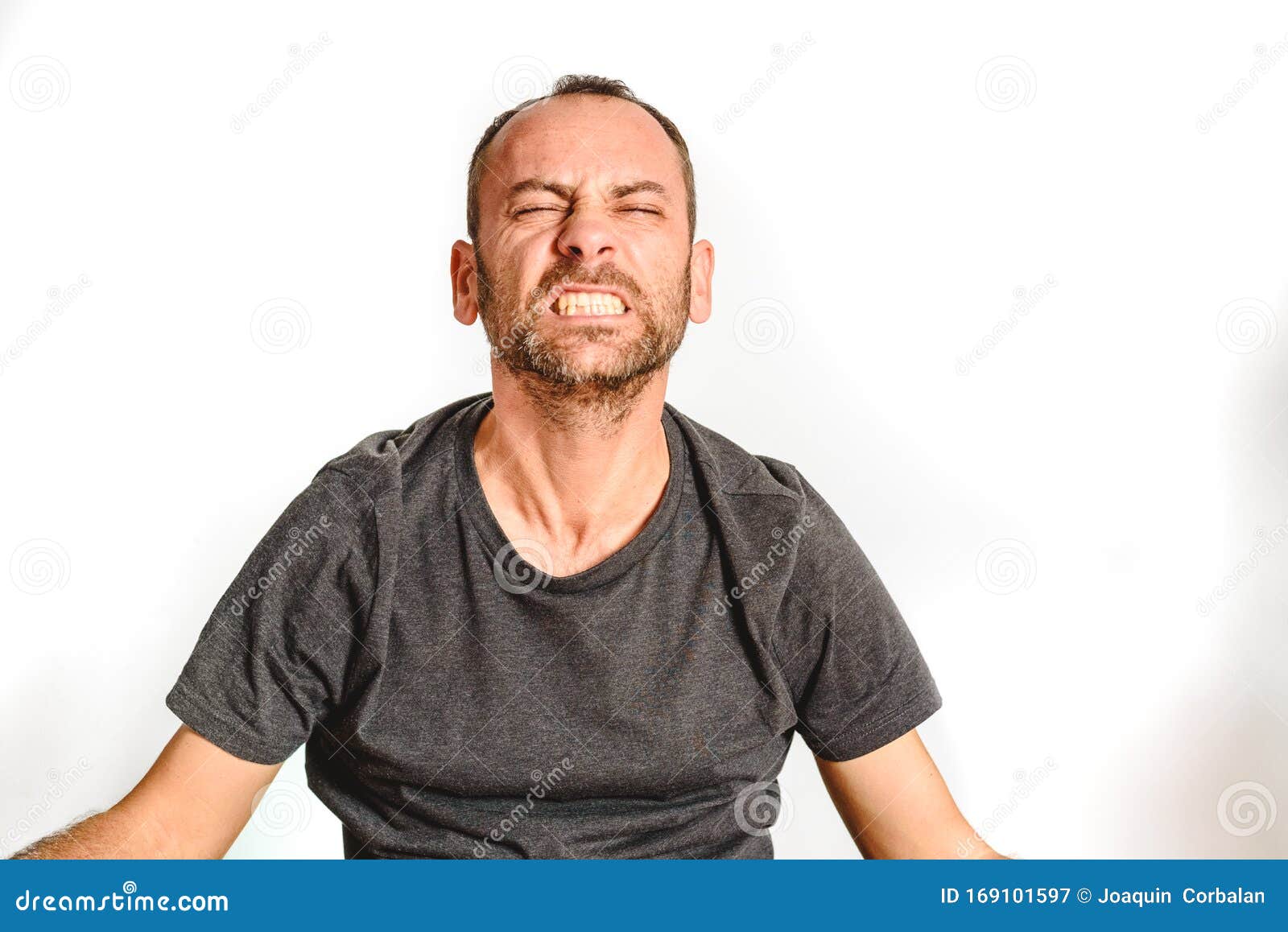 Man in Studio with Effort Face, Model Expressions Isolating White ...