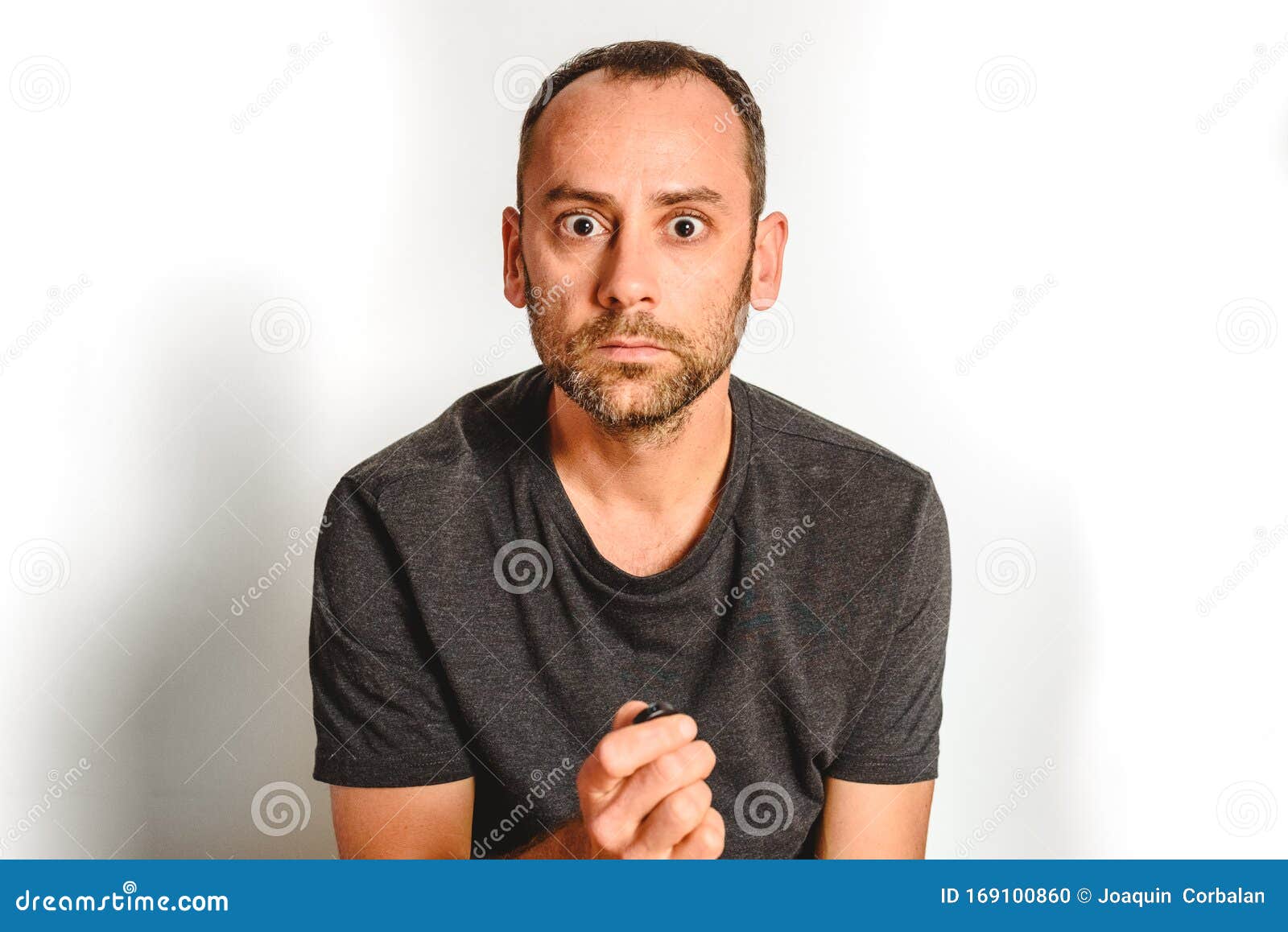 Man in Studio Looking at Camera Relaxed, Model Expressions Isolating ...