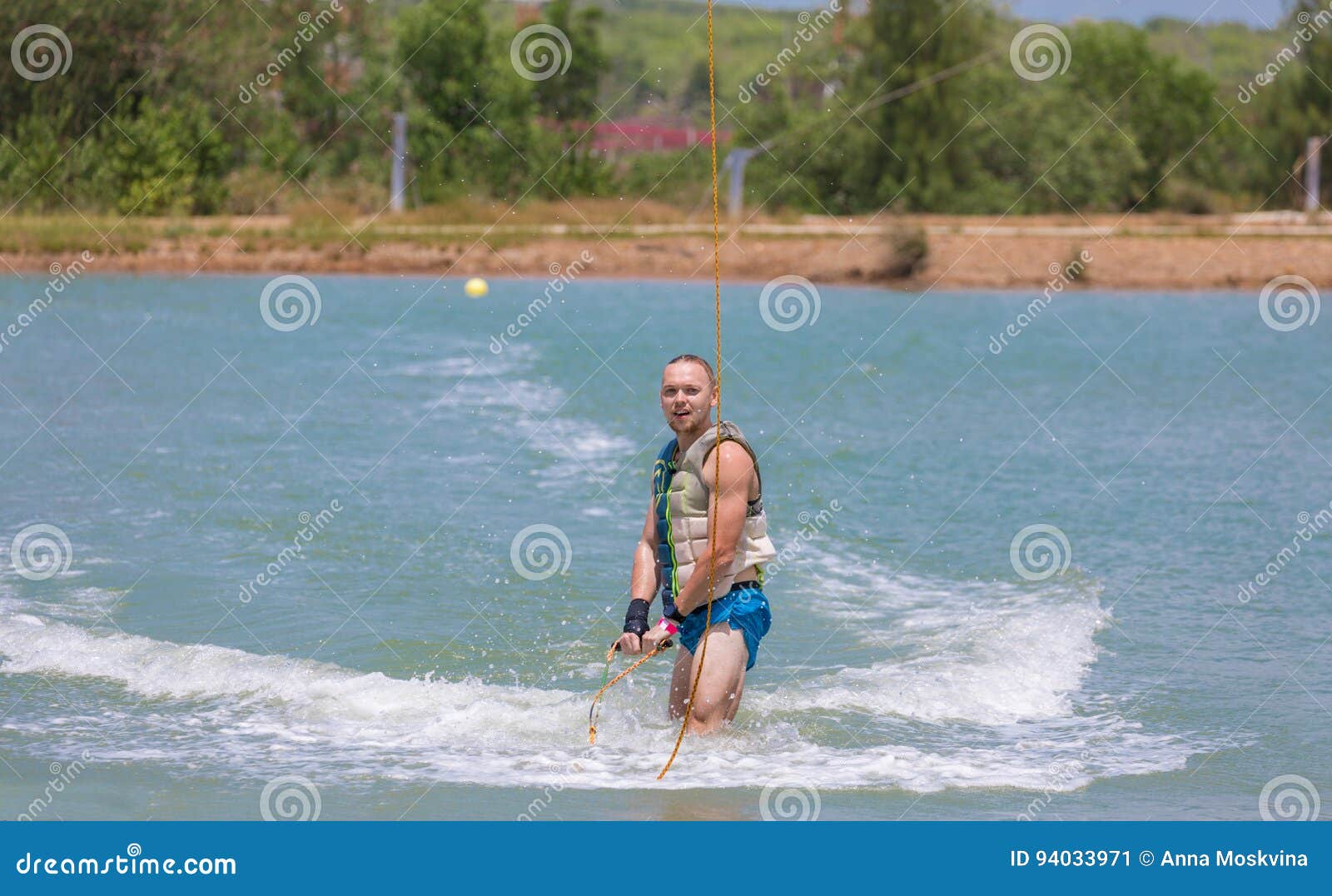Man Study Wakeboarding on a Blue Lake Stock Image - Image of active ...