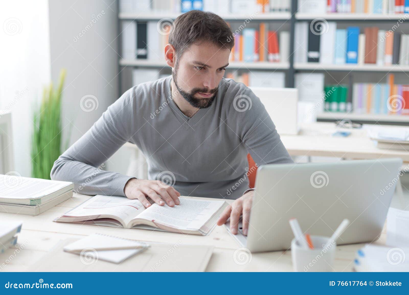 Man Studying and Connecting with a Laptop Stock Photo - Image of ...