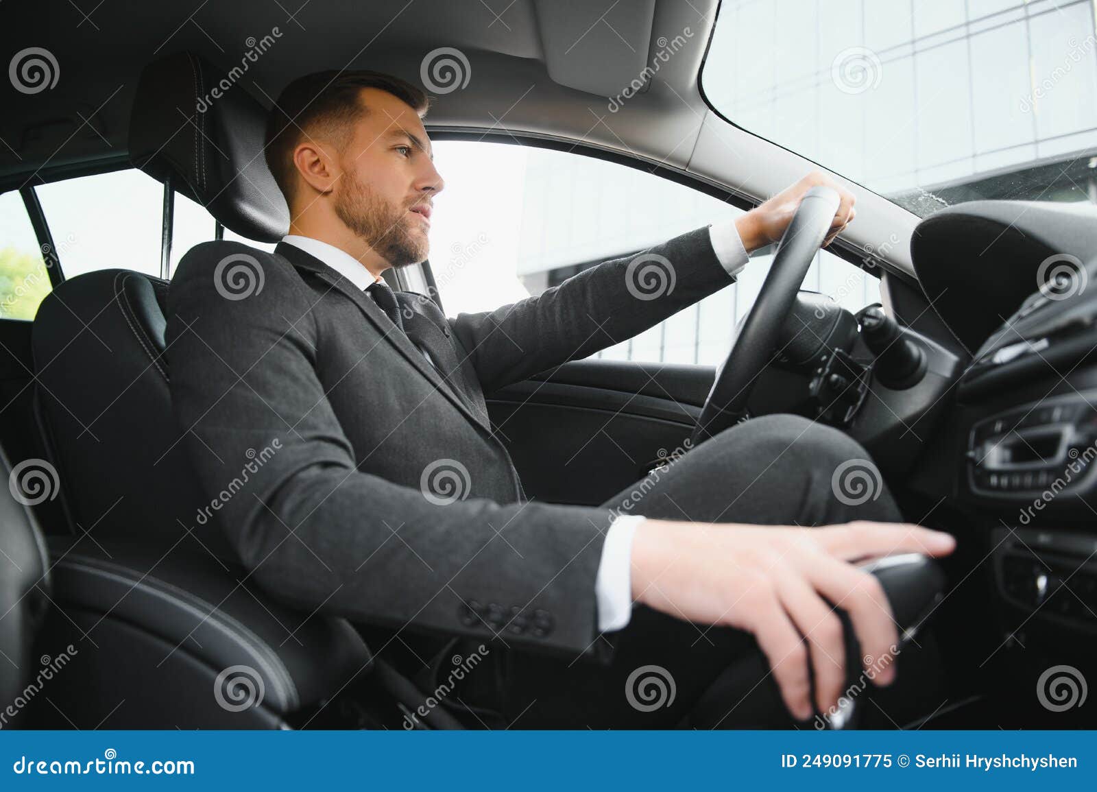 Man of Style and Status. Handsome Young Man in Full Suit Smiling while ...